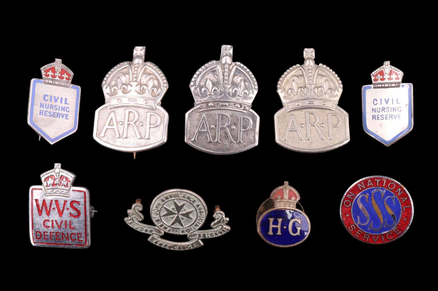 A small collection of Home Front badges including an "SSS On National ...