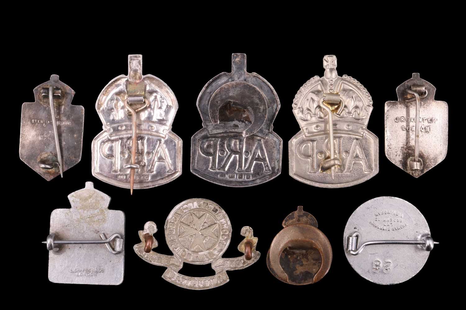 A small collection of Home Front badges including an "SSS On National ...