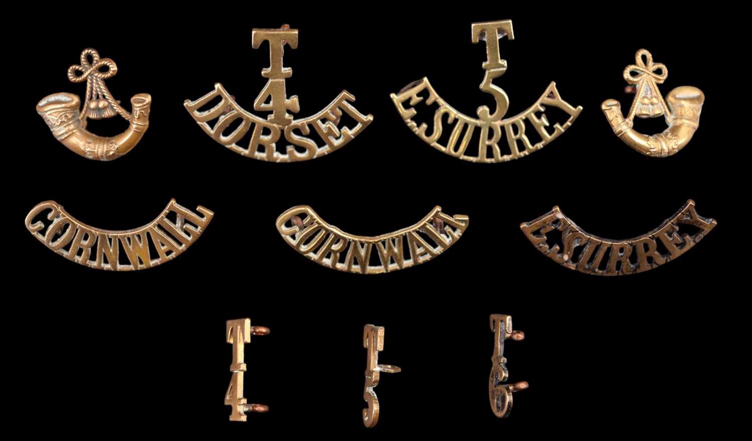 Five various territorial shoulder titles