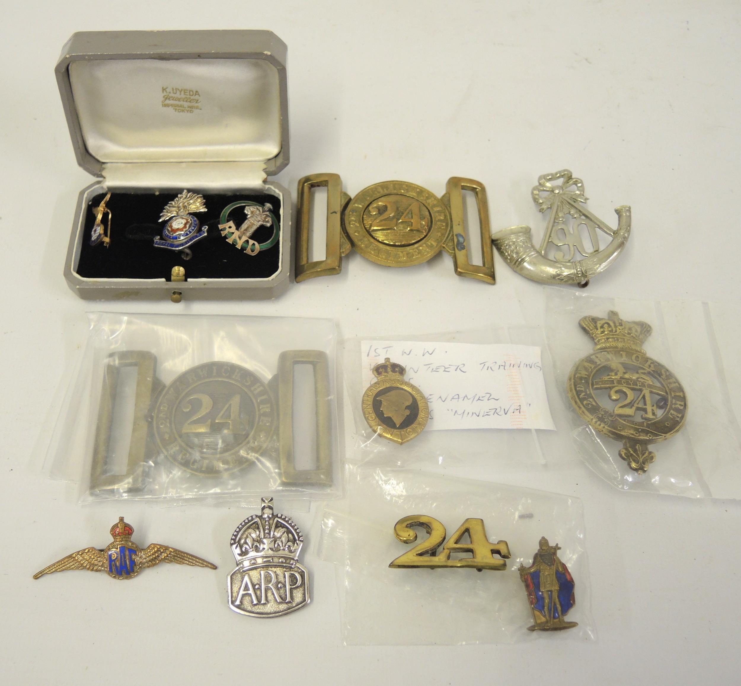 Two Second Warwickshire regiment belt buckles, cap badge and shoulder ...
