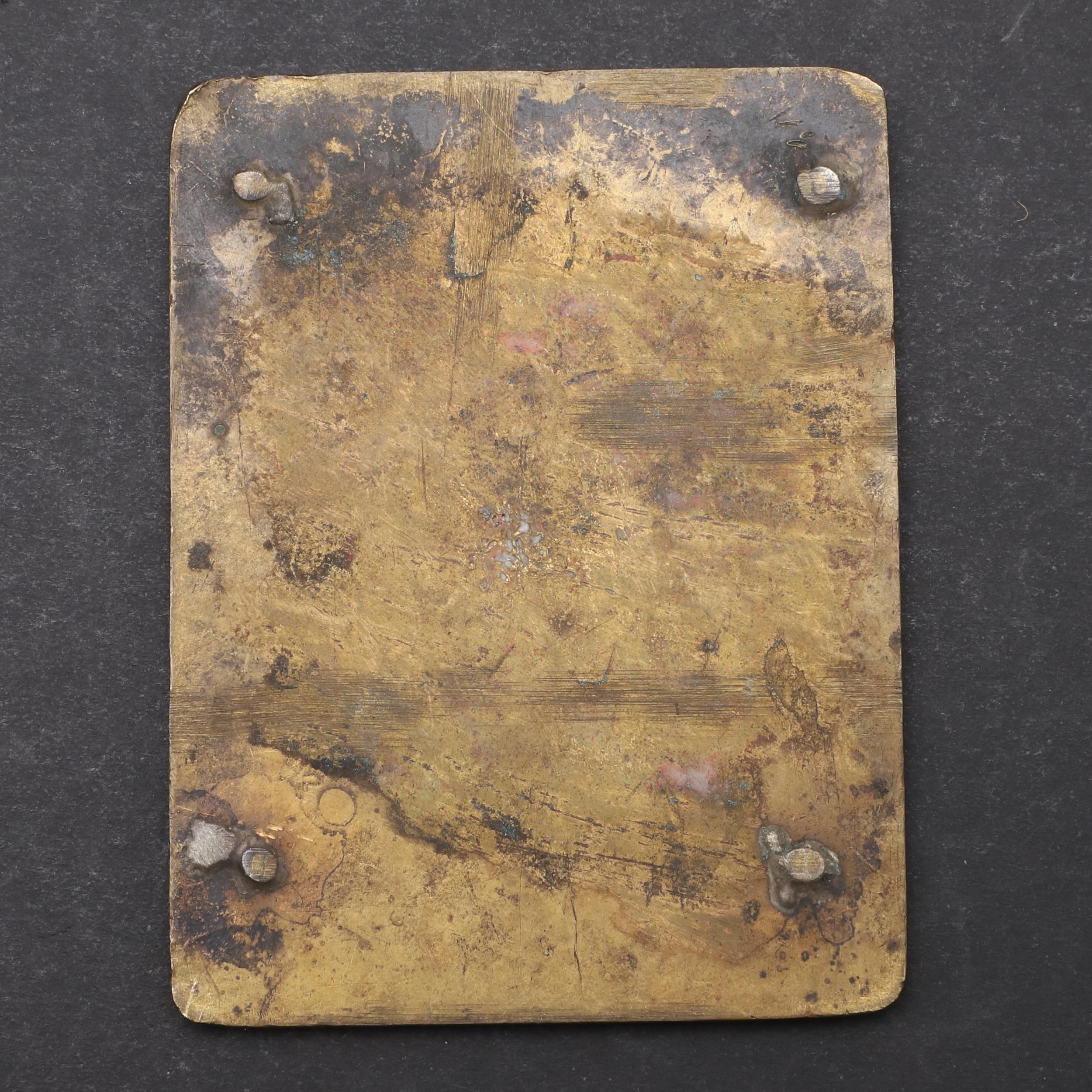 A Victorian brass cross belt plate with '57' beneath a crown and within ...