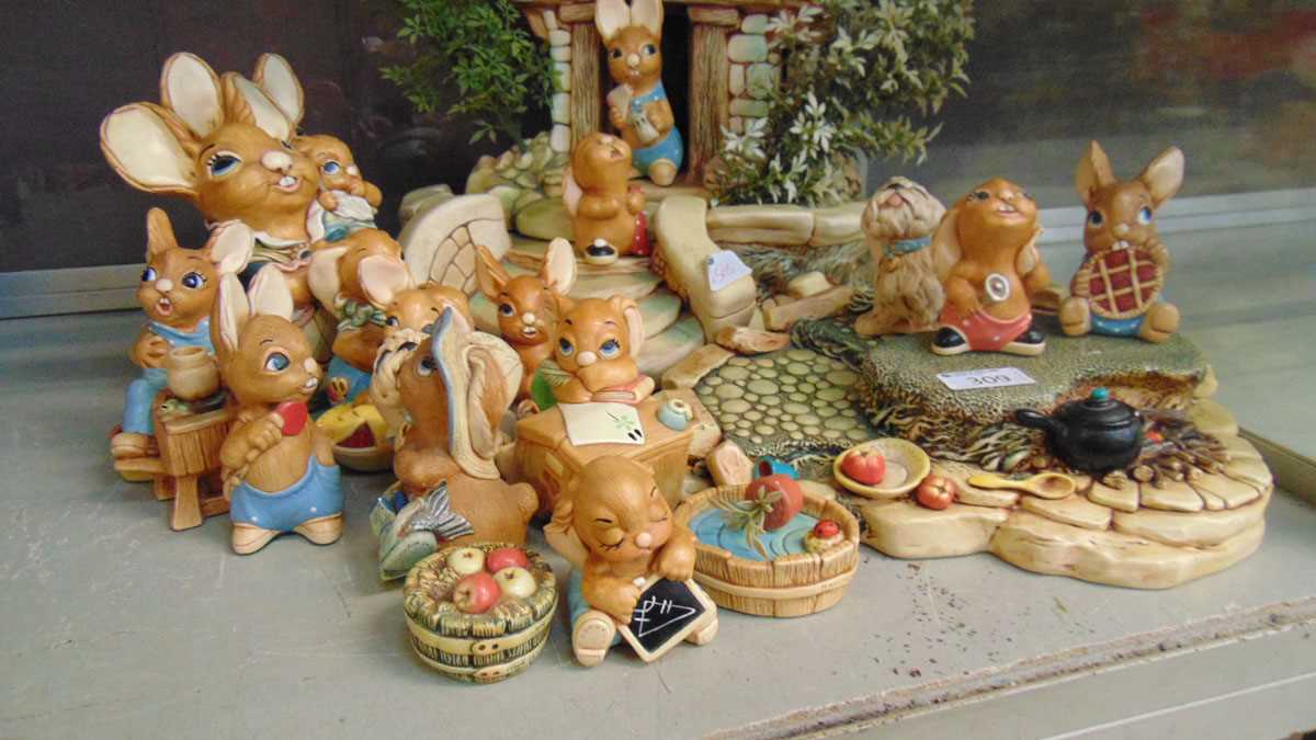 A collection of Pendelfin rabbits and houses