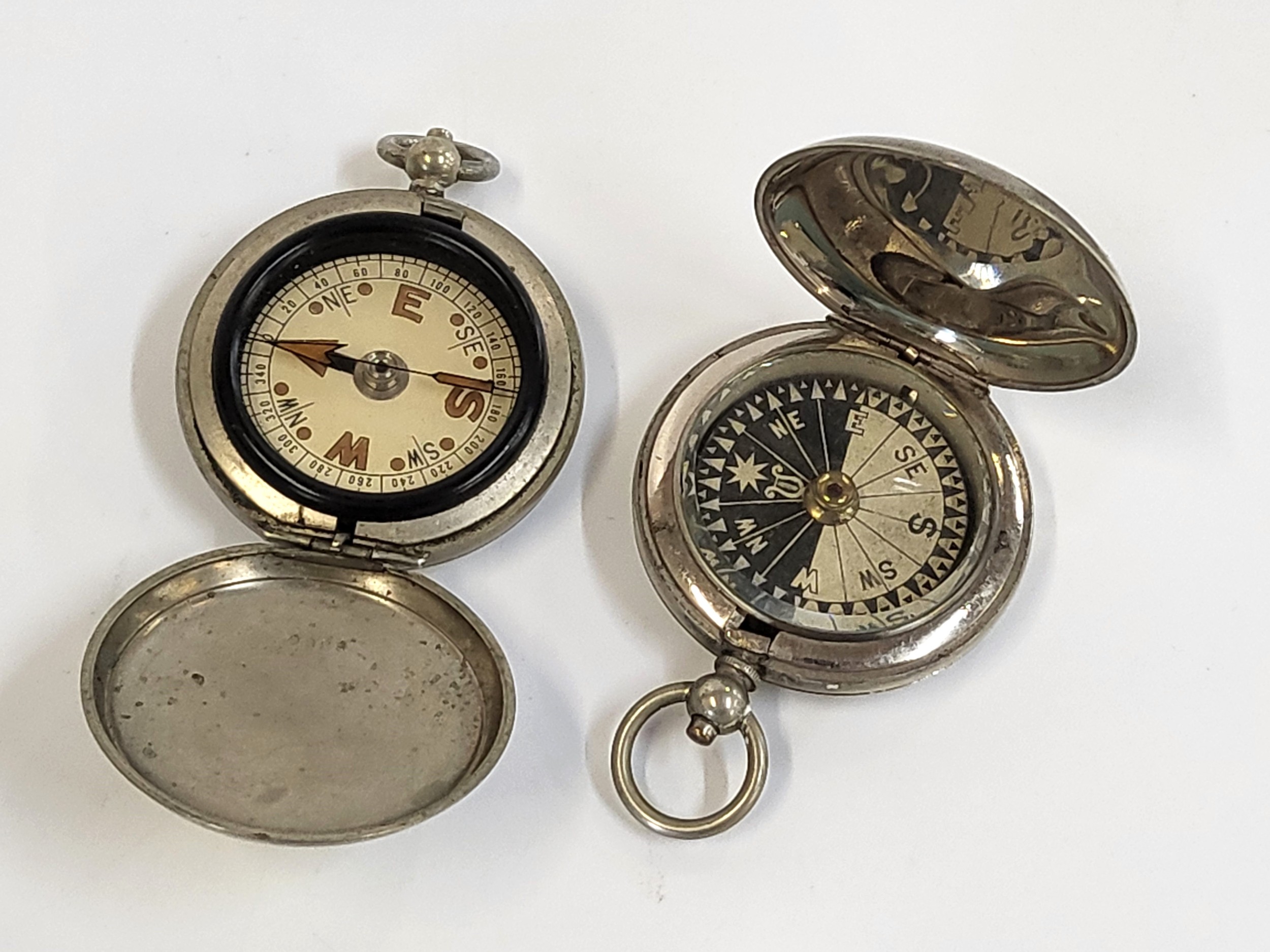 Two compasses 1911 (Maker J. Hicks) & 1940 both 4.5cm diameter