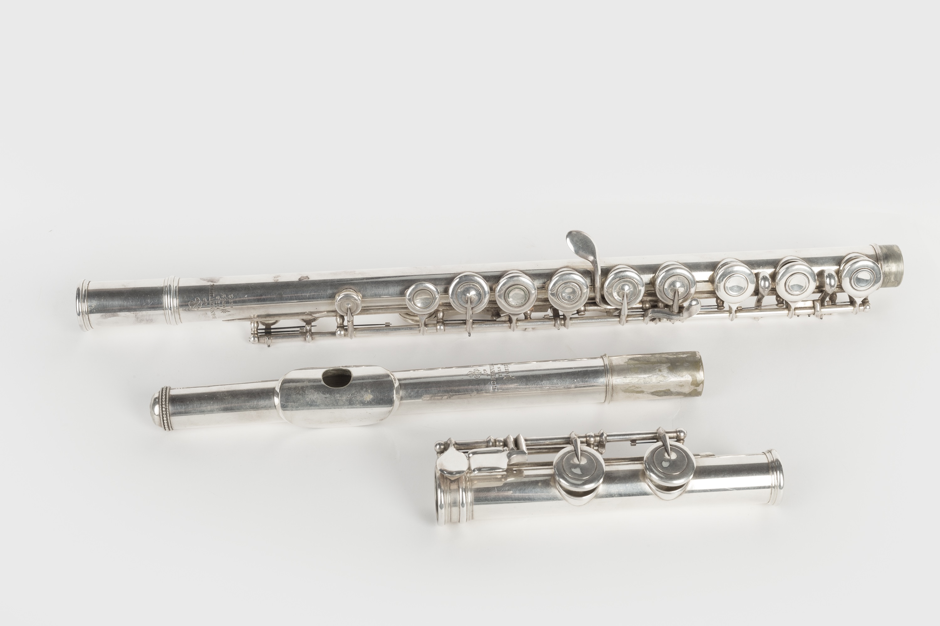 A French silver plated flute, by Bonneville Fils, Paris, No. 1288, 67 ...