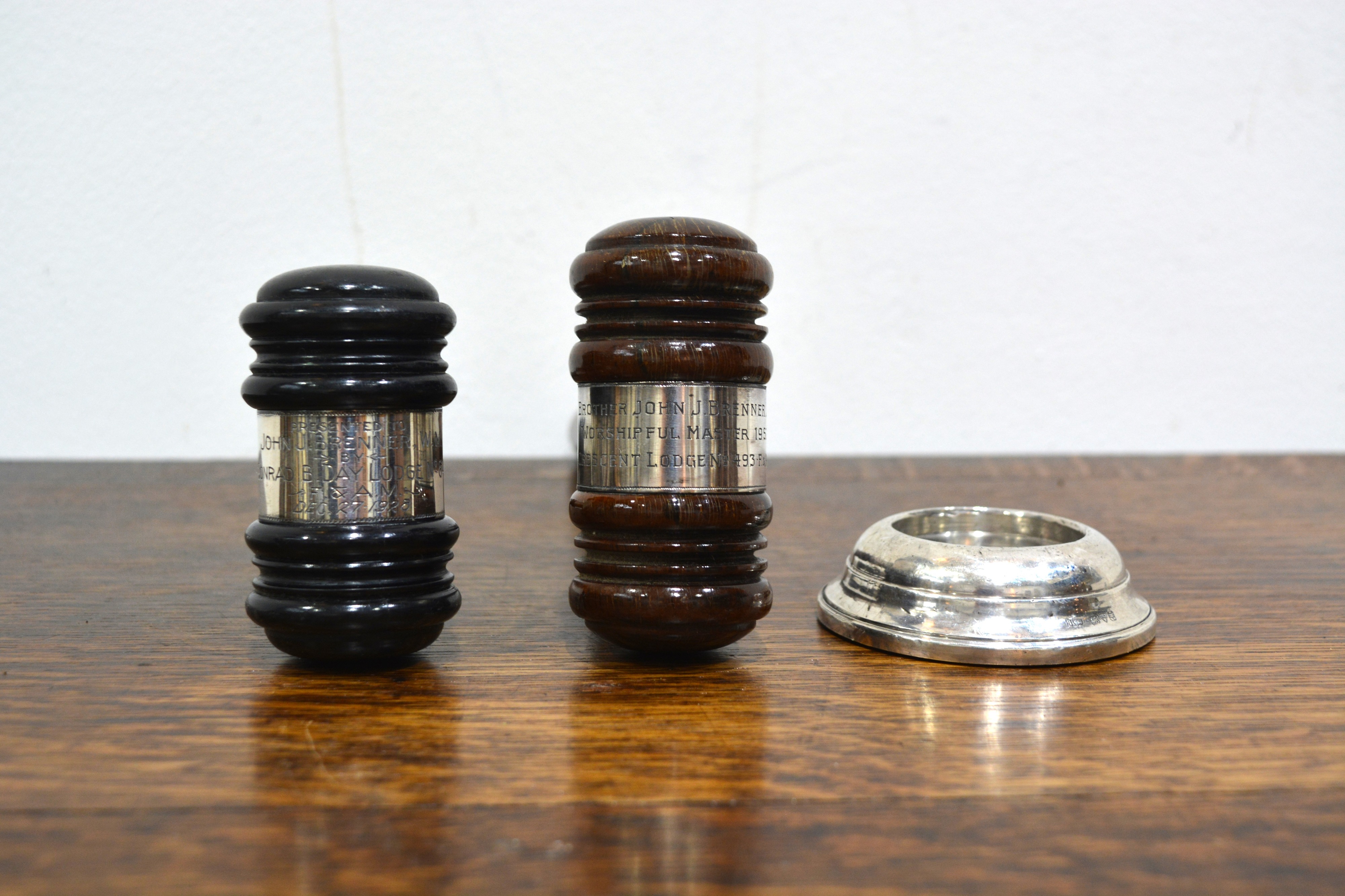 Two Masonic gavels and an unassociated gavel stand or anvil the ...