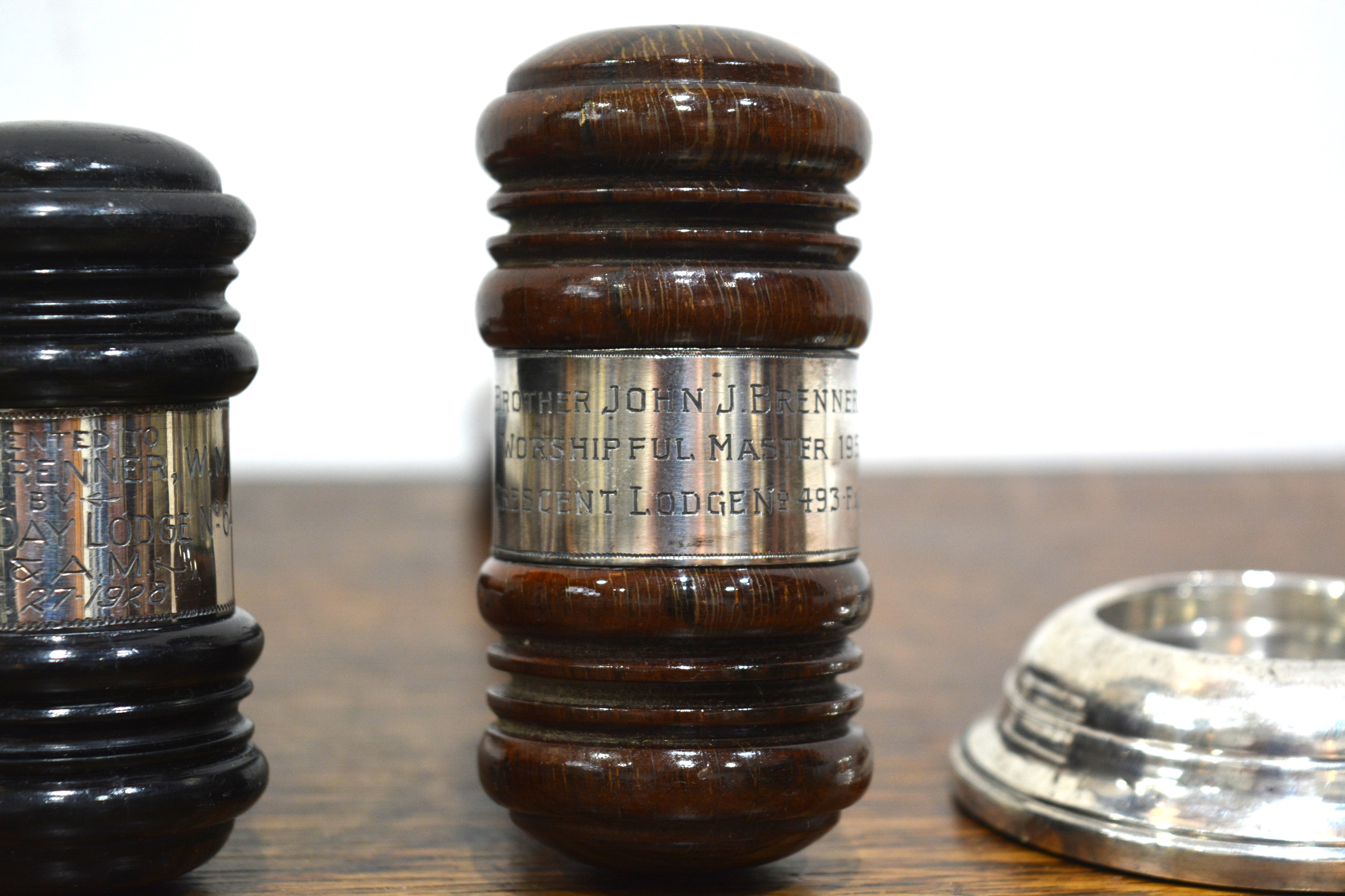 Two Masonic gavels and an unassociated gavel stand or anvil the ...