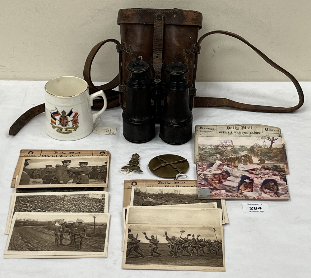 A collection of WW1 memorabilia to comprise badges, official War ...