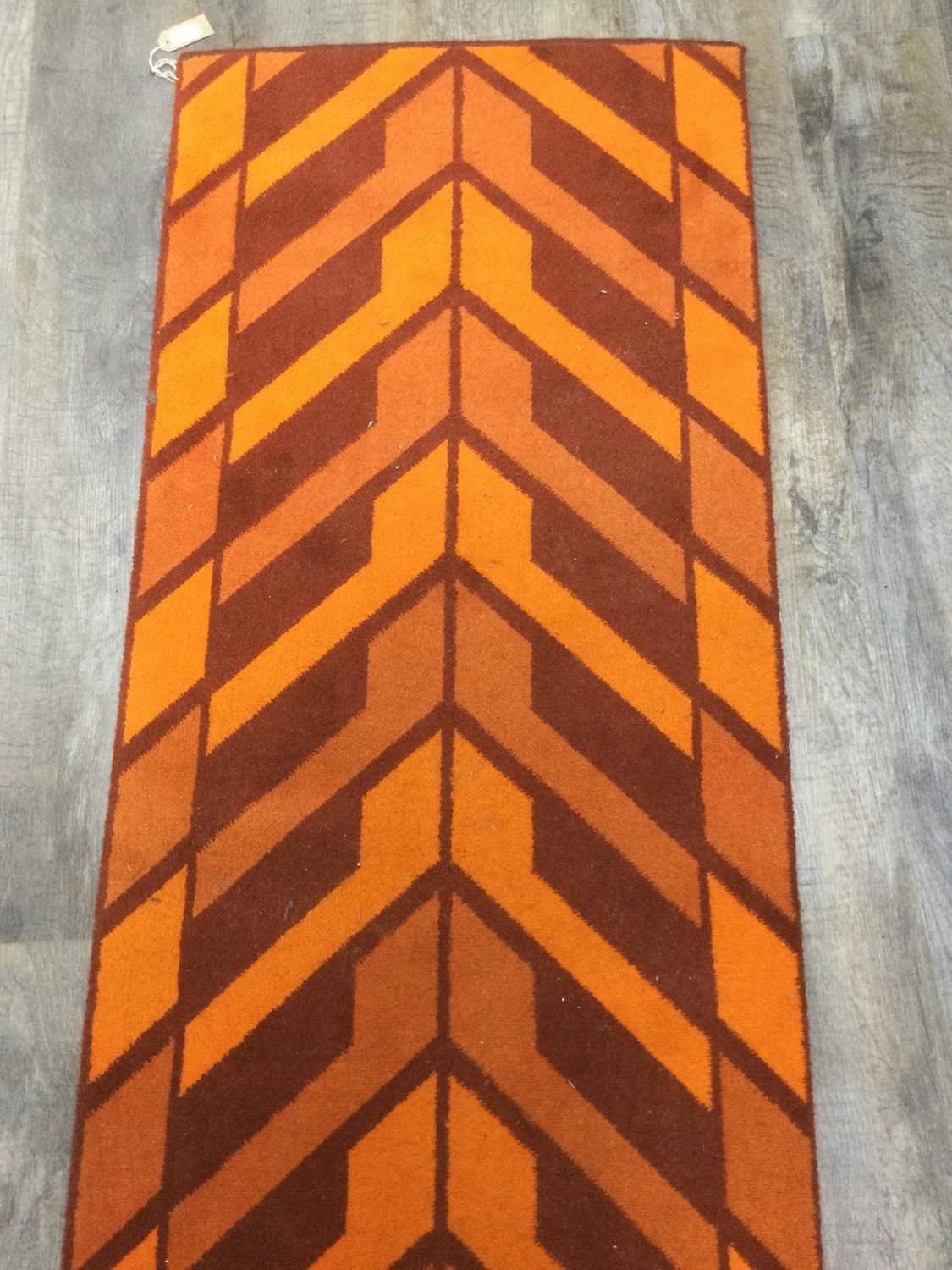 AXMINSTER CARPET RUNNER OF ART DECO DESIGN, POST-WAR in burnt orange ...