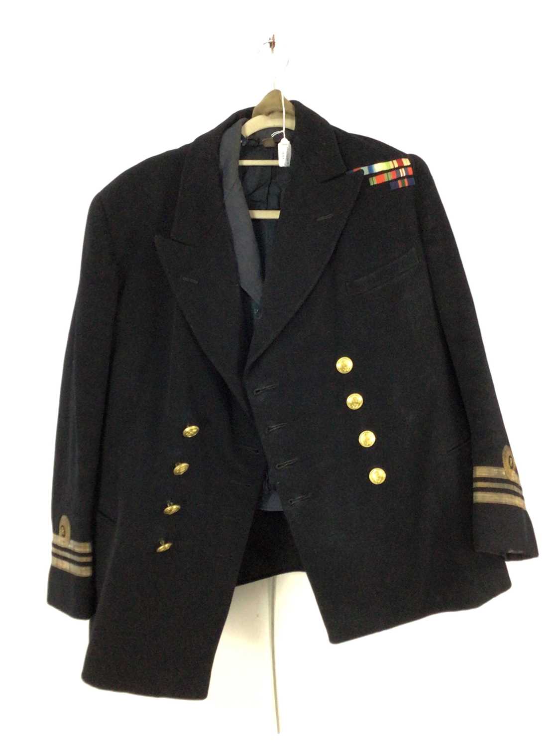 BRITISH NAVAL LIEUTENANT COMMANDER JACKET AND CAP, ALONG WITH FURTHER ...