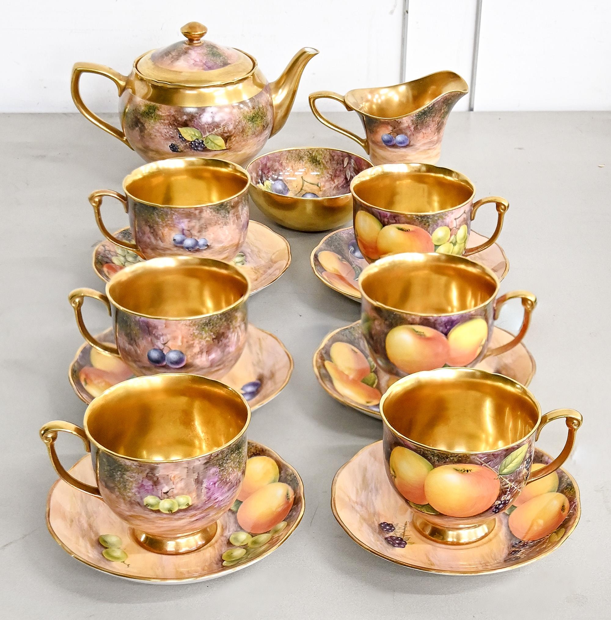 An outside-decorated English porcelain tea service, c1970, painted by ...