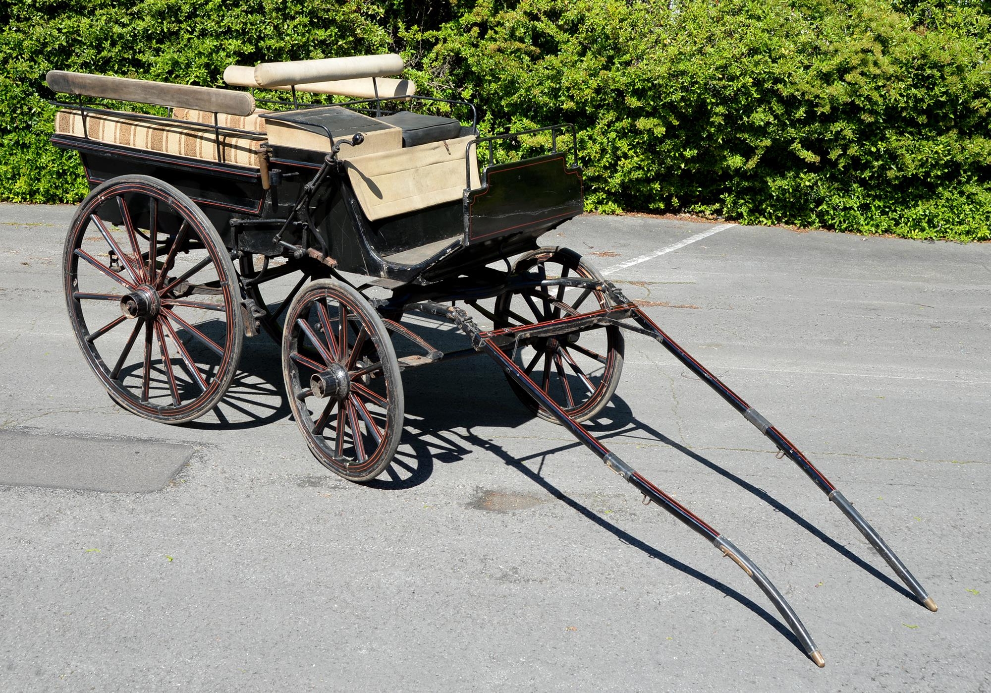 Horse drawn vehicle. A four-wheeled open carriage, waggonette, Northern ...