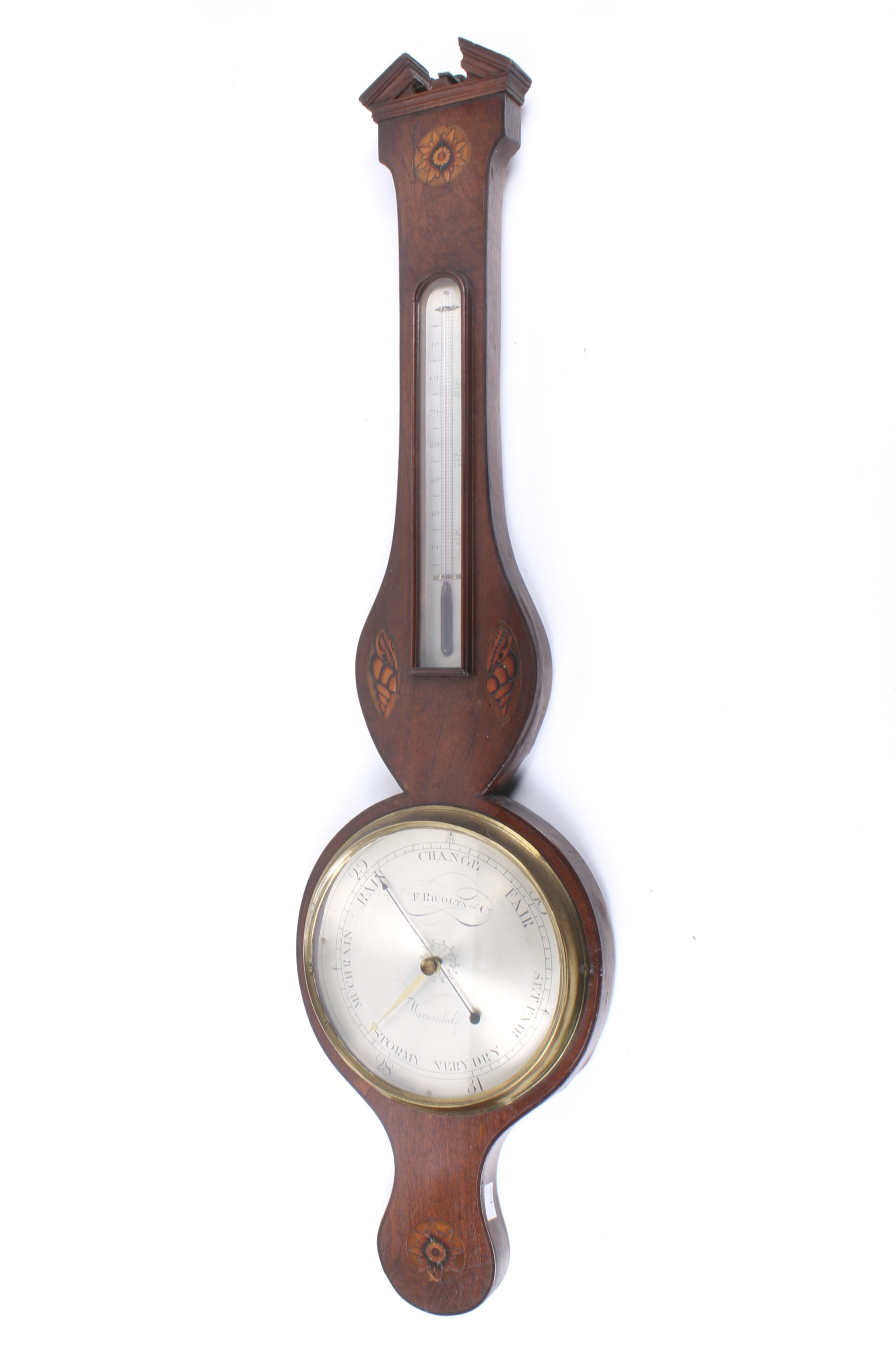 A 19th century mahogany framed wheel barometer. The case with a turned ...