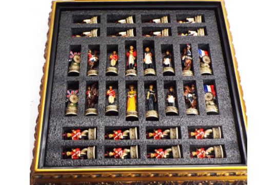 Chess set with chess pieces stored beneath the board in the form of ...