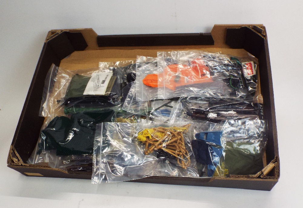 Large collection of action man uniforms and accessories, guns, bunk bed ...