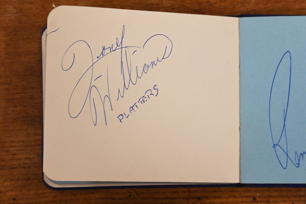 Two autograph books with various signatures to include Buddy Holly ...