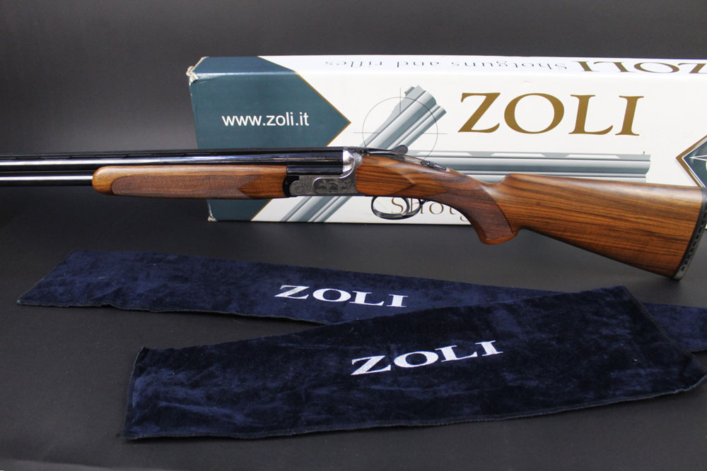 A Zoli 20 bore over/under game shotgun, with 29 1/2" multi choke ...