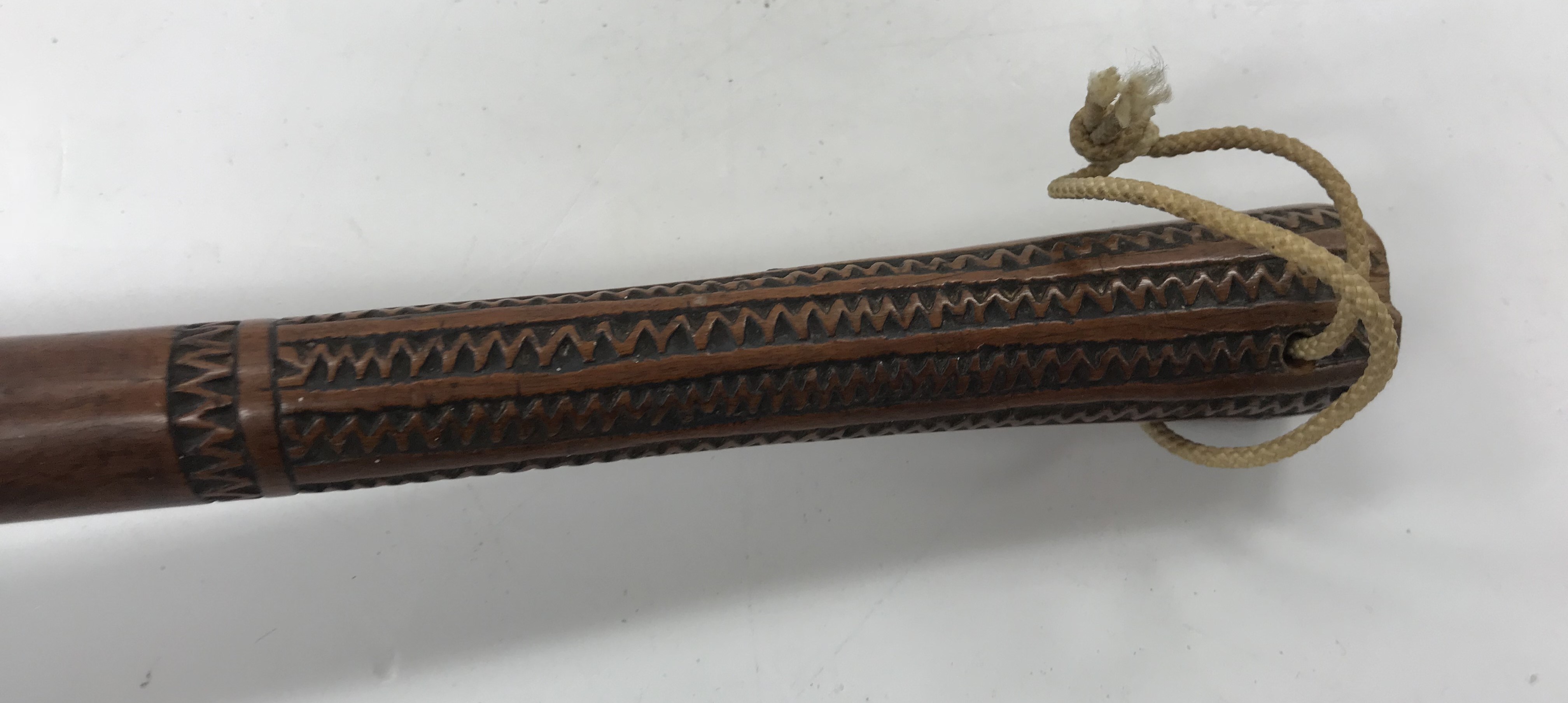 A 19th Century Zulu knobkerrie, the rough ball head on a turned handle ...