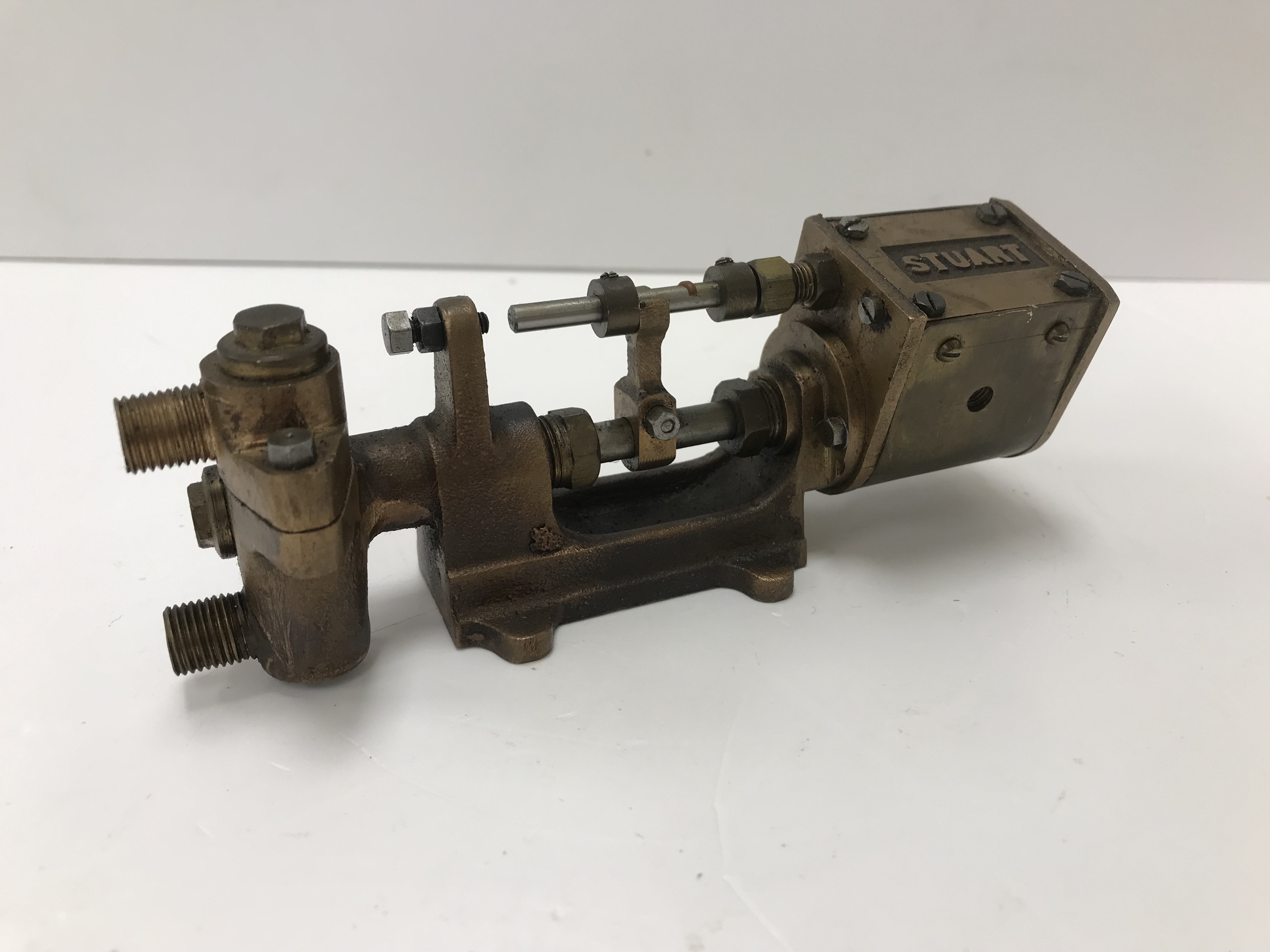 A Stuart Turner brass steam pump 14 cm long