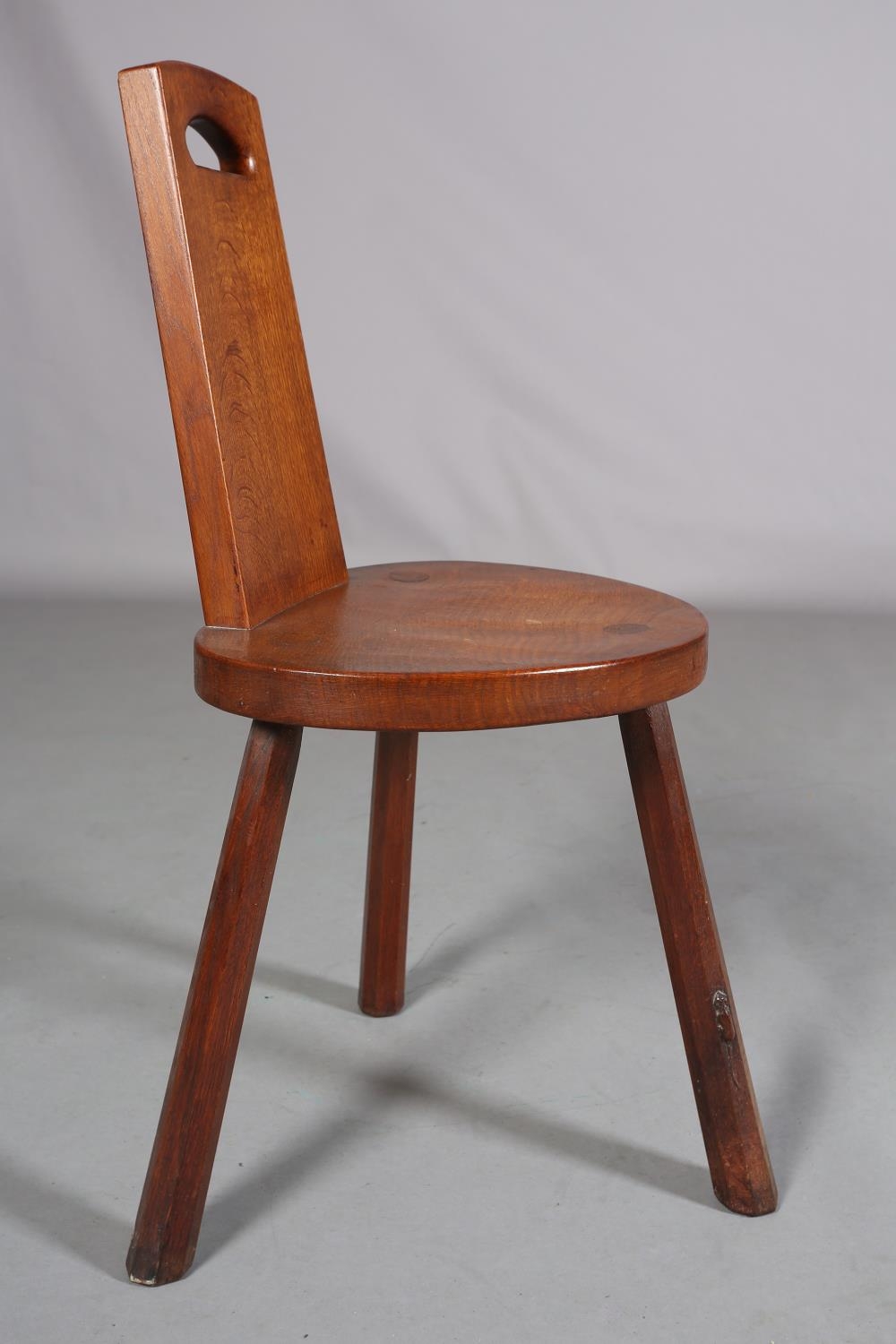 THOMPSON OF KILBURN 'MOUSEMAN', an oak spinning chair the tapered back ...