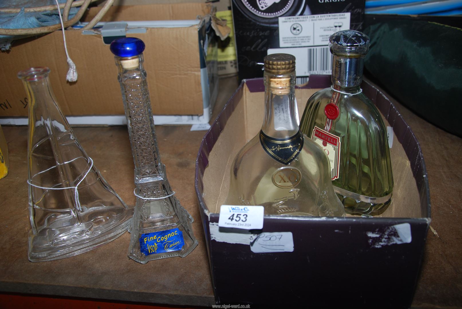 Four empty liquor bottles.
