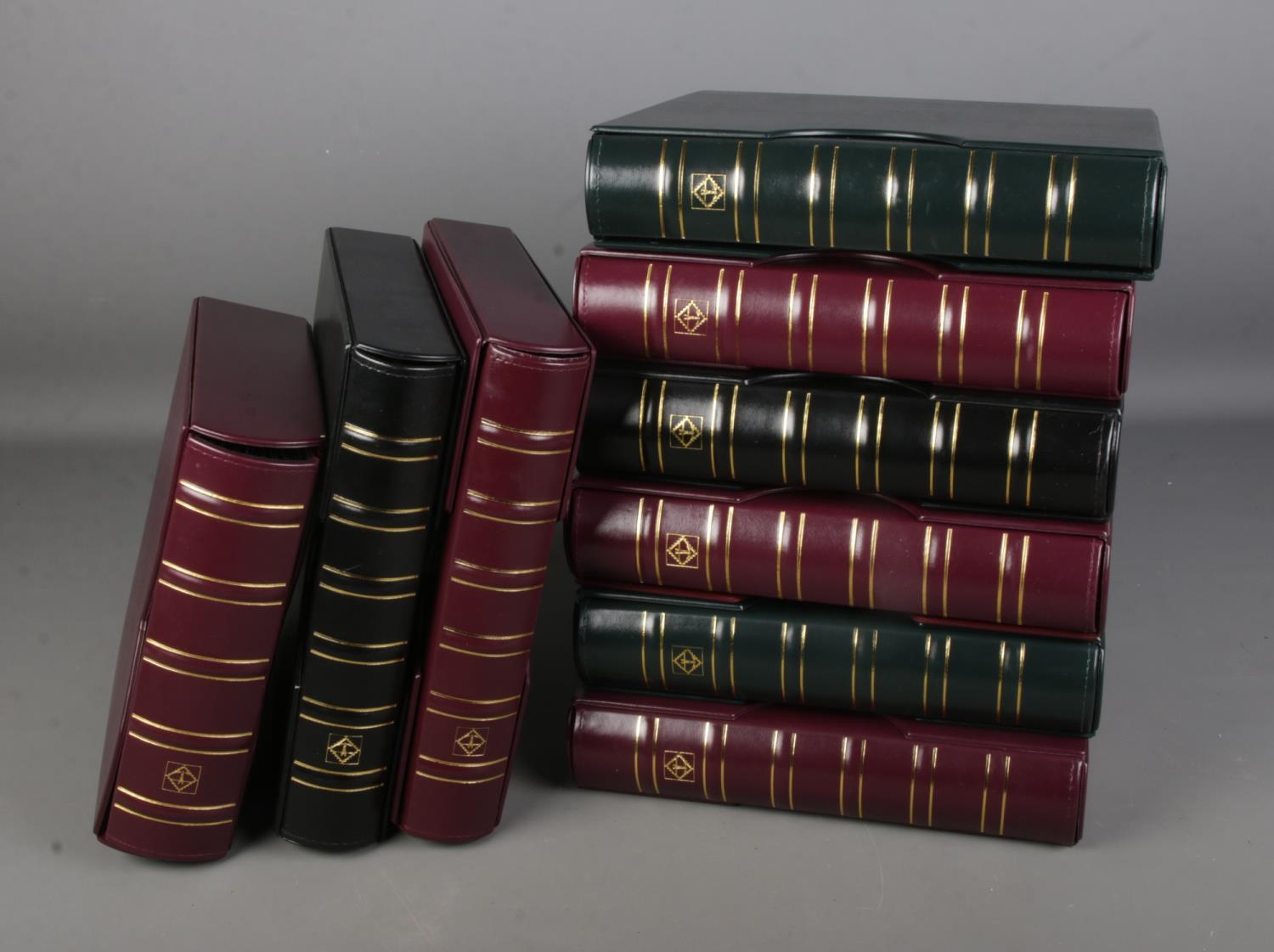 A collection of blank Lighthouse classic luxury stamp album binders ...