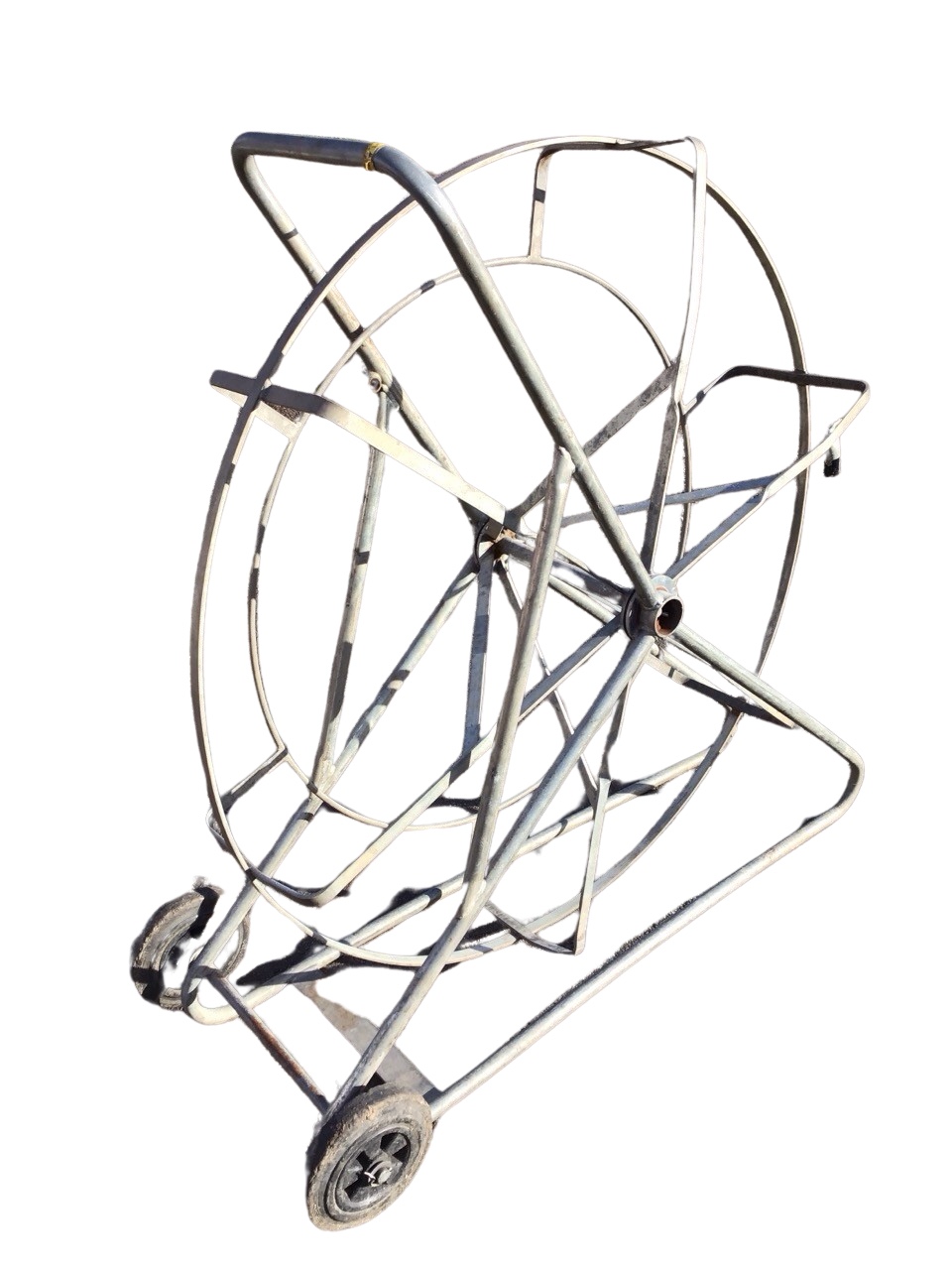 A galvanised cable drum on tubular trolley stand and frame, the ...