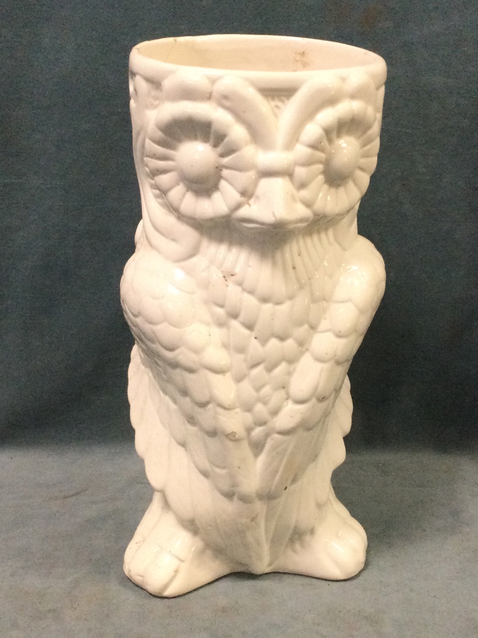 A ceramic owl stick stand; containing nine miscellaneous walking sticks ...