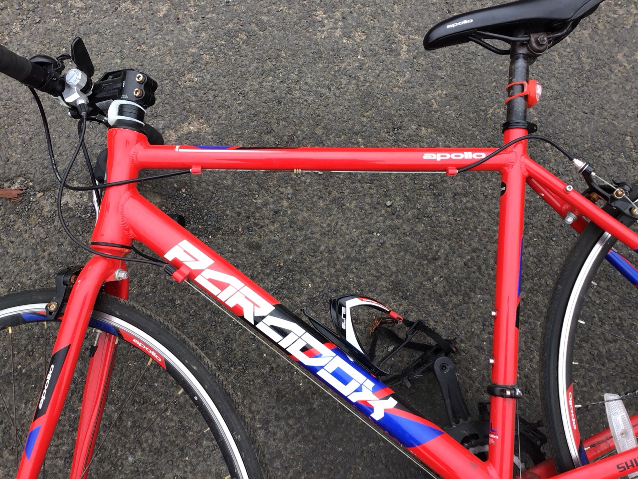 An Apollo Paradox racing bicycle with drop handlebars, padded saddle ...