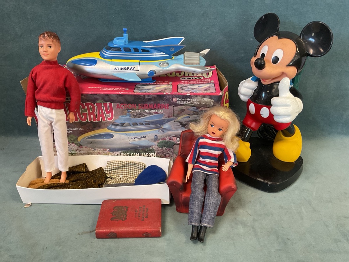 A collection of 70s toys - a Tyco Mickey Mouse hiker telephone, a Post ...