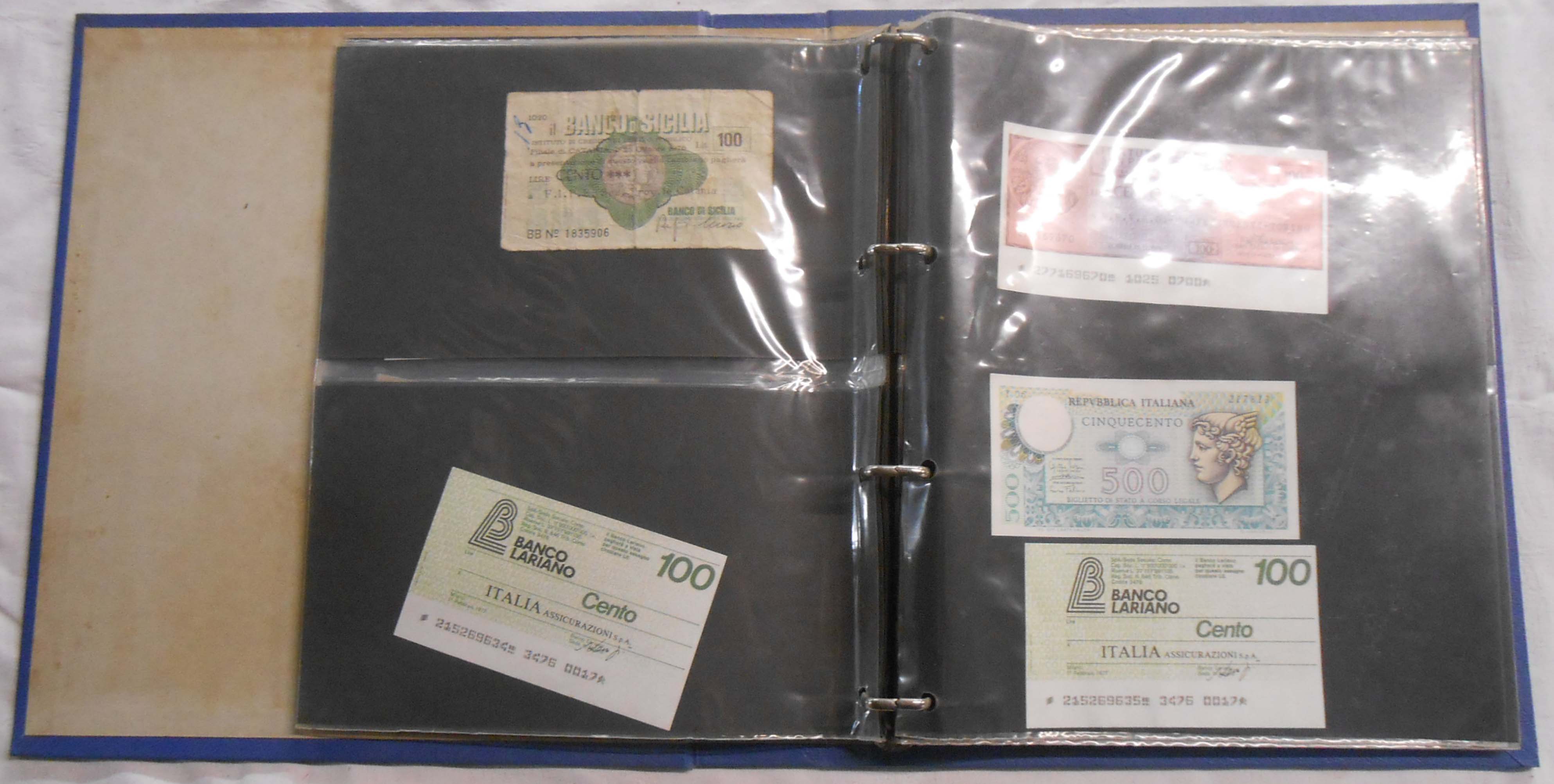 A ring bound album containing a collection of mainly 20th Century world ...