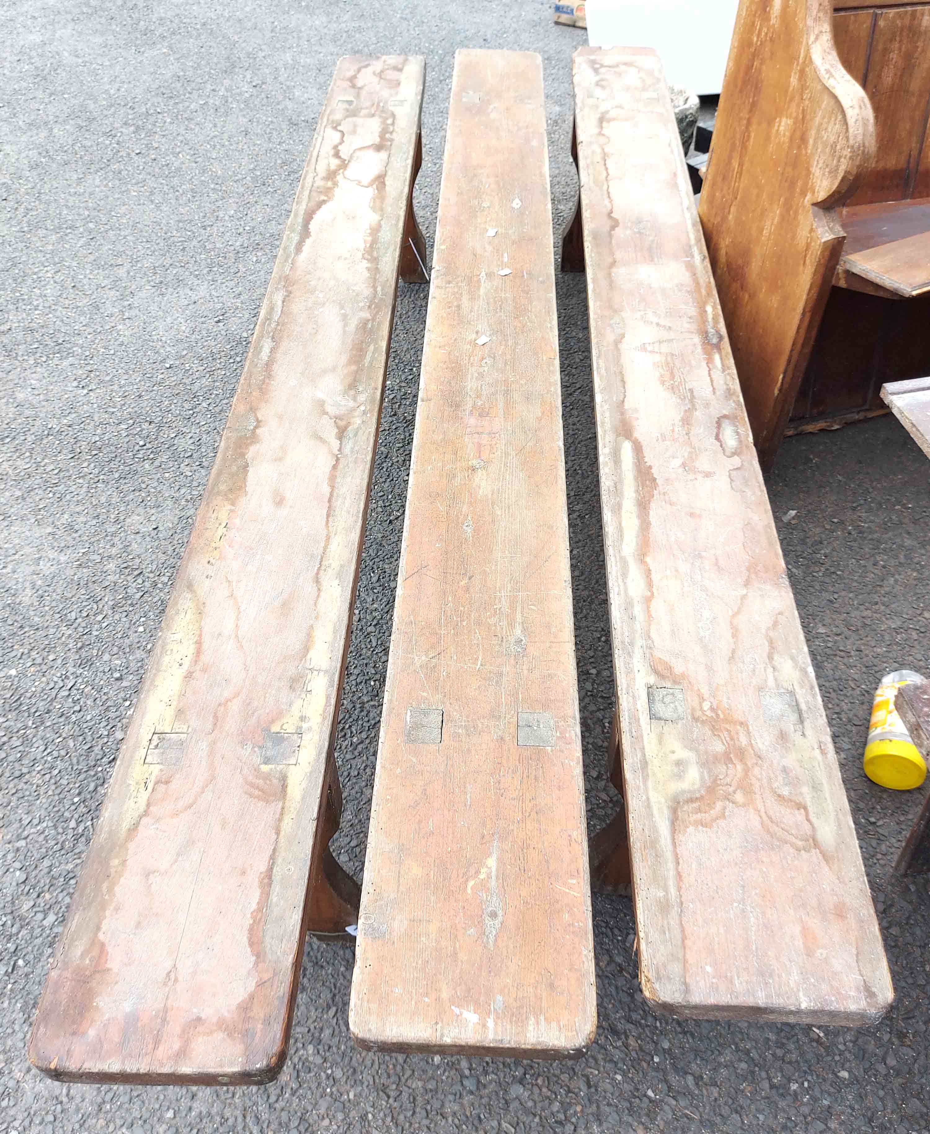 Three old wooden form benches
