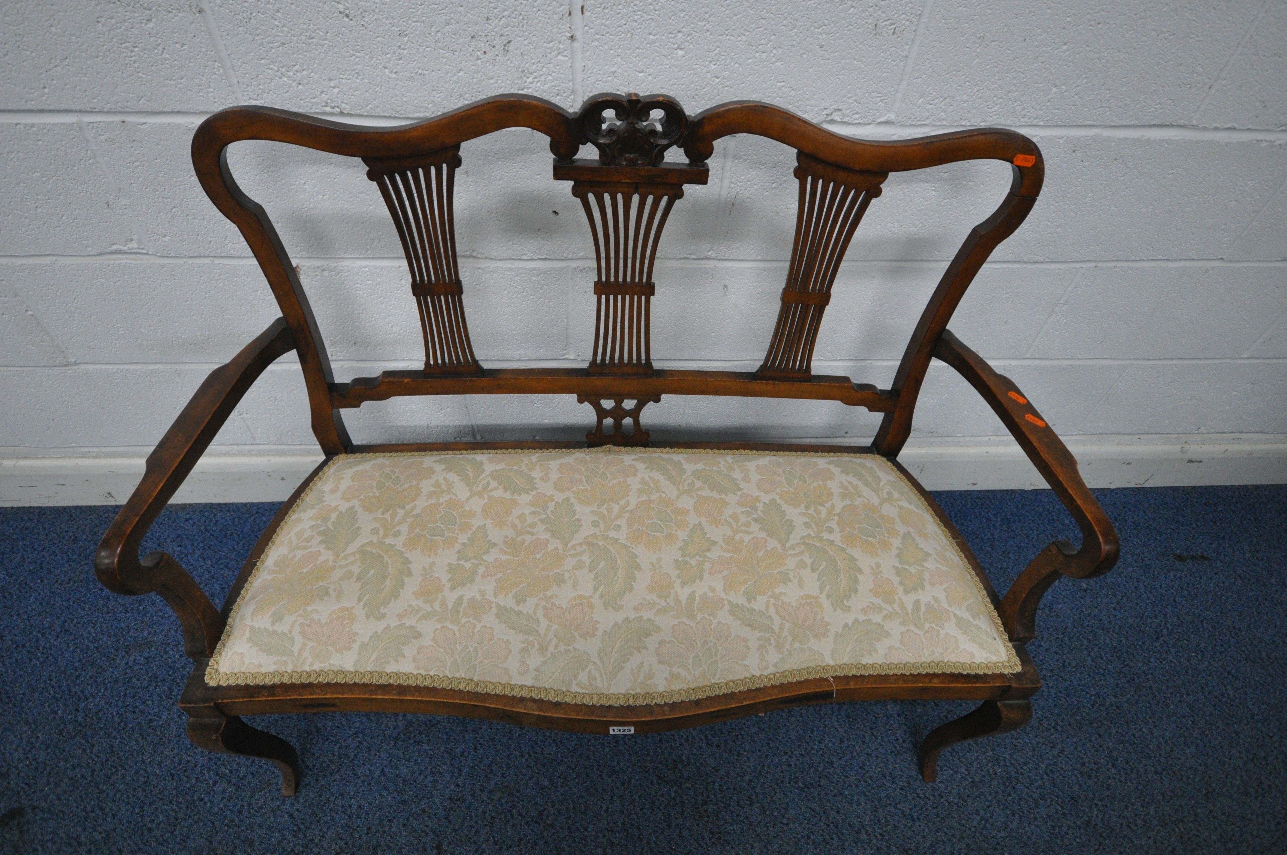 A VICTORIAN MAHOGANY SOFA, with wavy top and scrolled crest, three ...