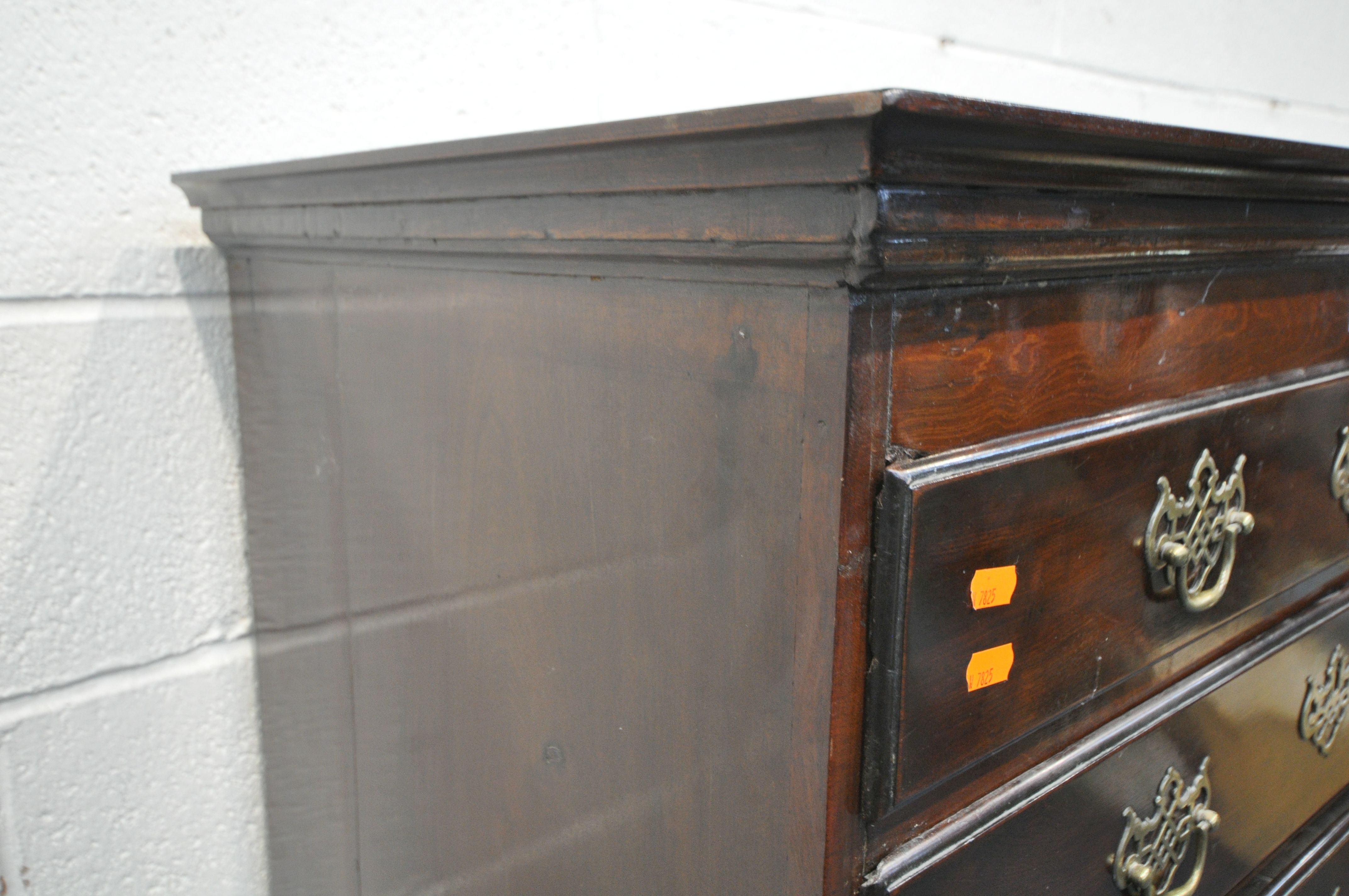 A GEORGIAN MAHOGANY TALL CHEST OF SEVEN GRADUATED DRAWERS, on bracket ...