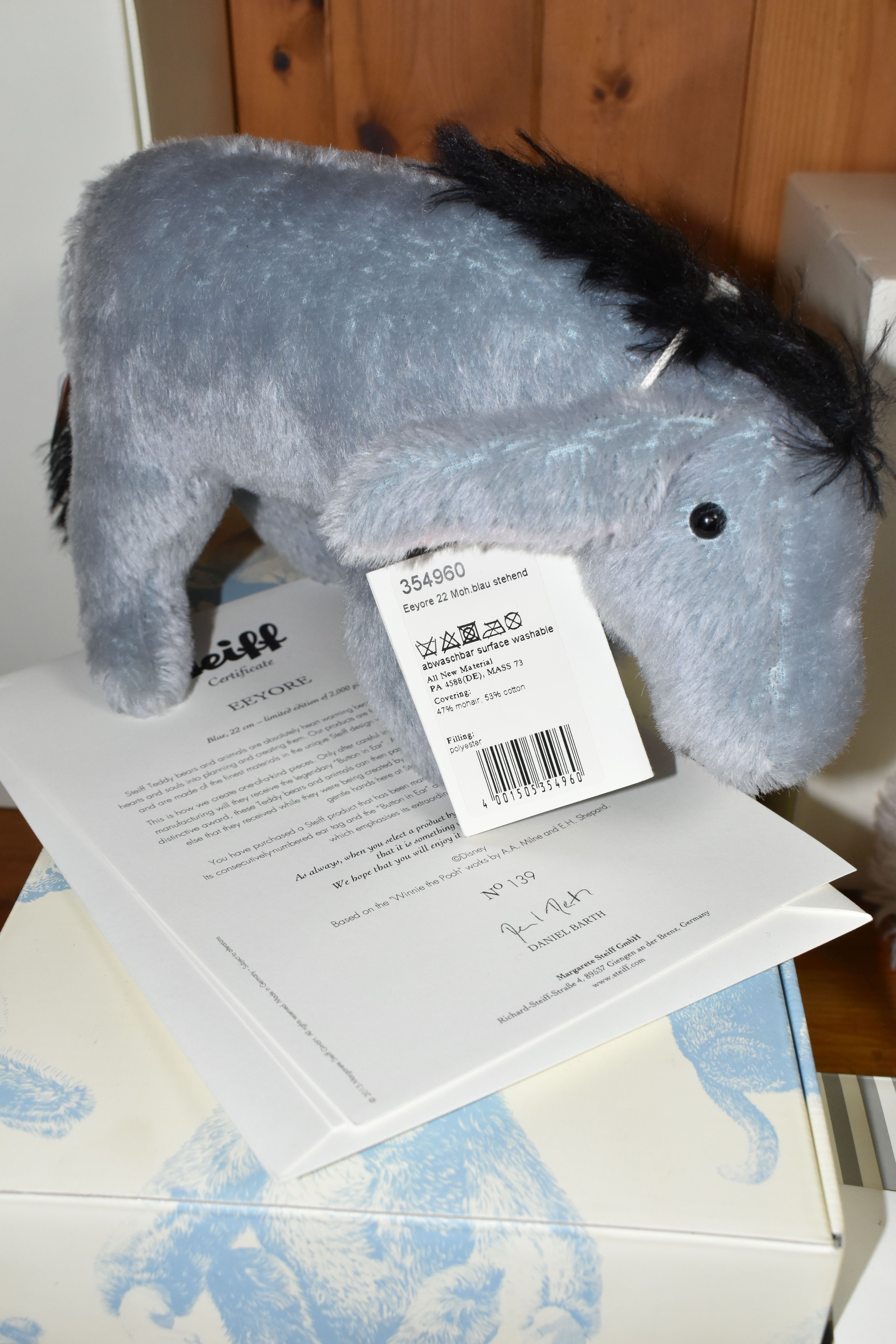 A STEIFF LIMITED EDITION 'EEYORE', 139/2000, gold button, white label ...