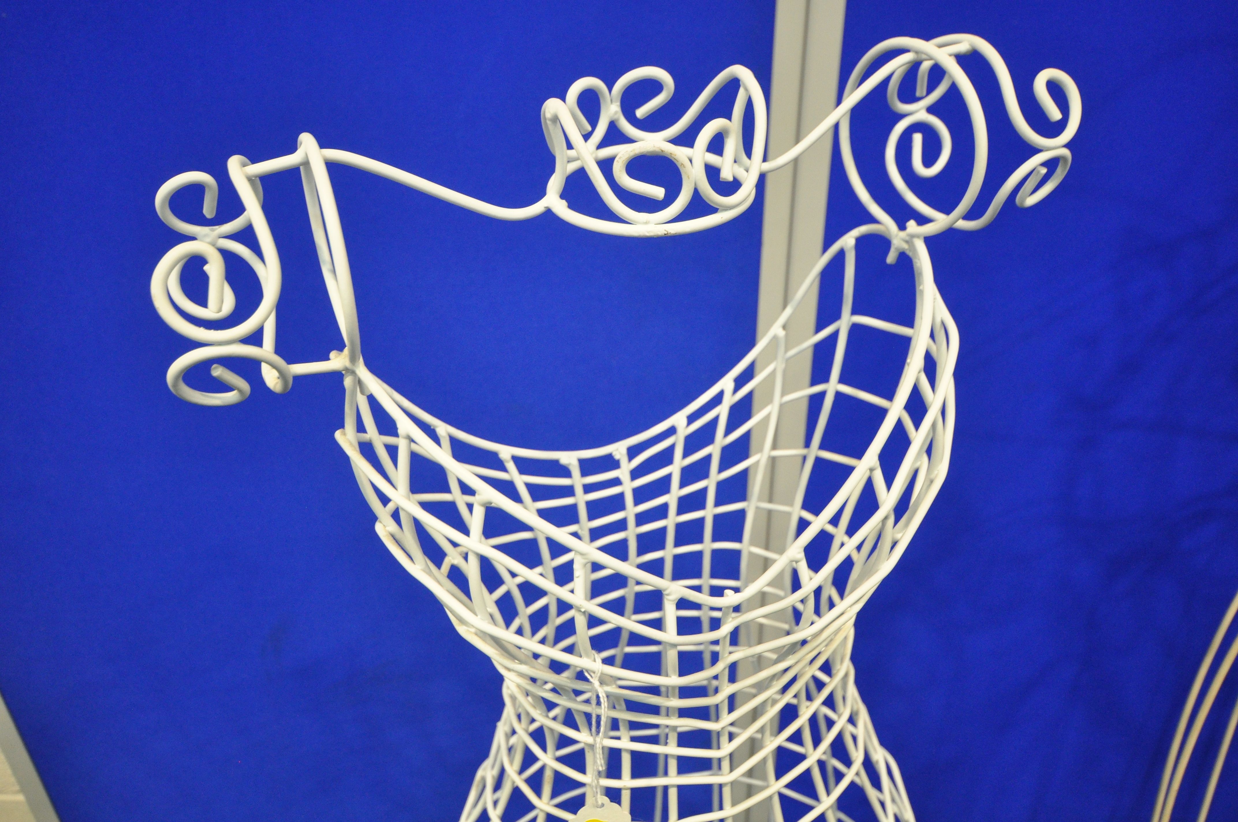 TWO WIRE DRESS MANNEQUINS, each on a pole support and four scrolled ...