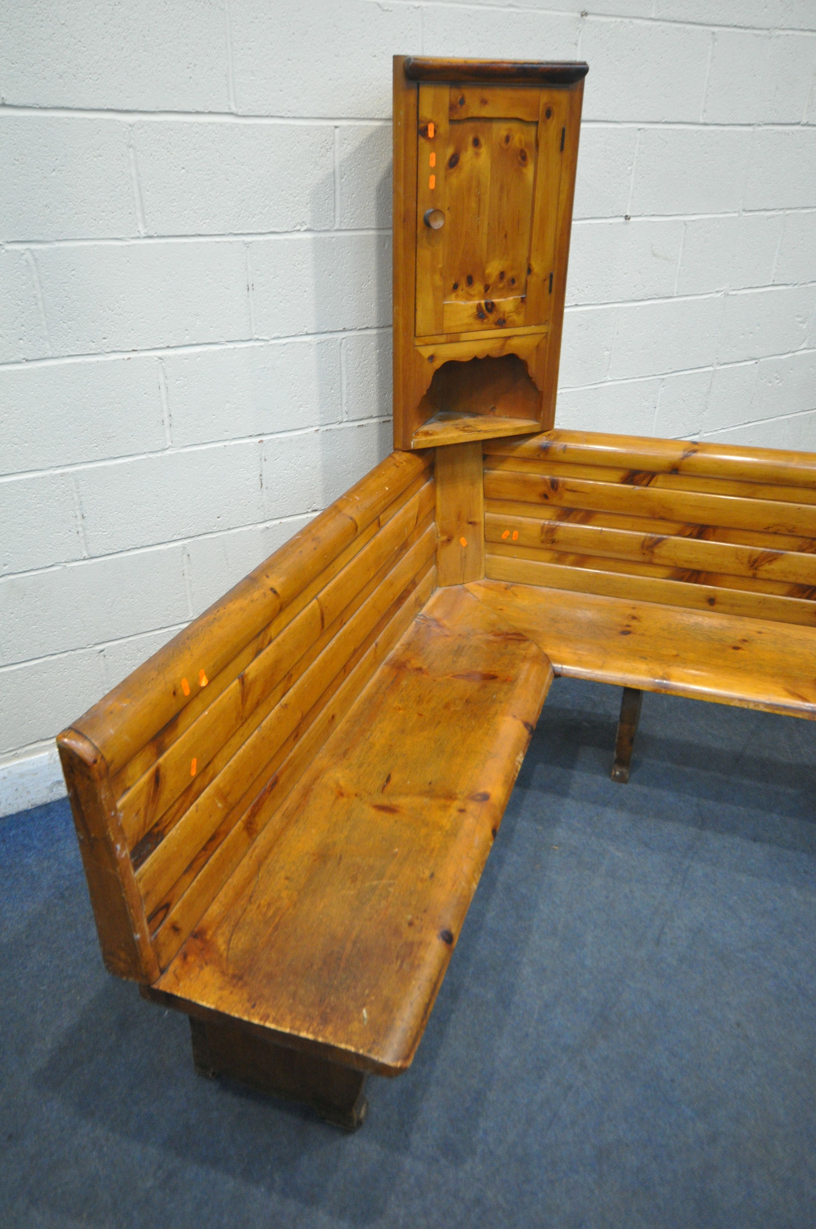 A PINE CORNER BENCH, with a later corner unit to the corner, length ...