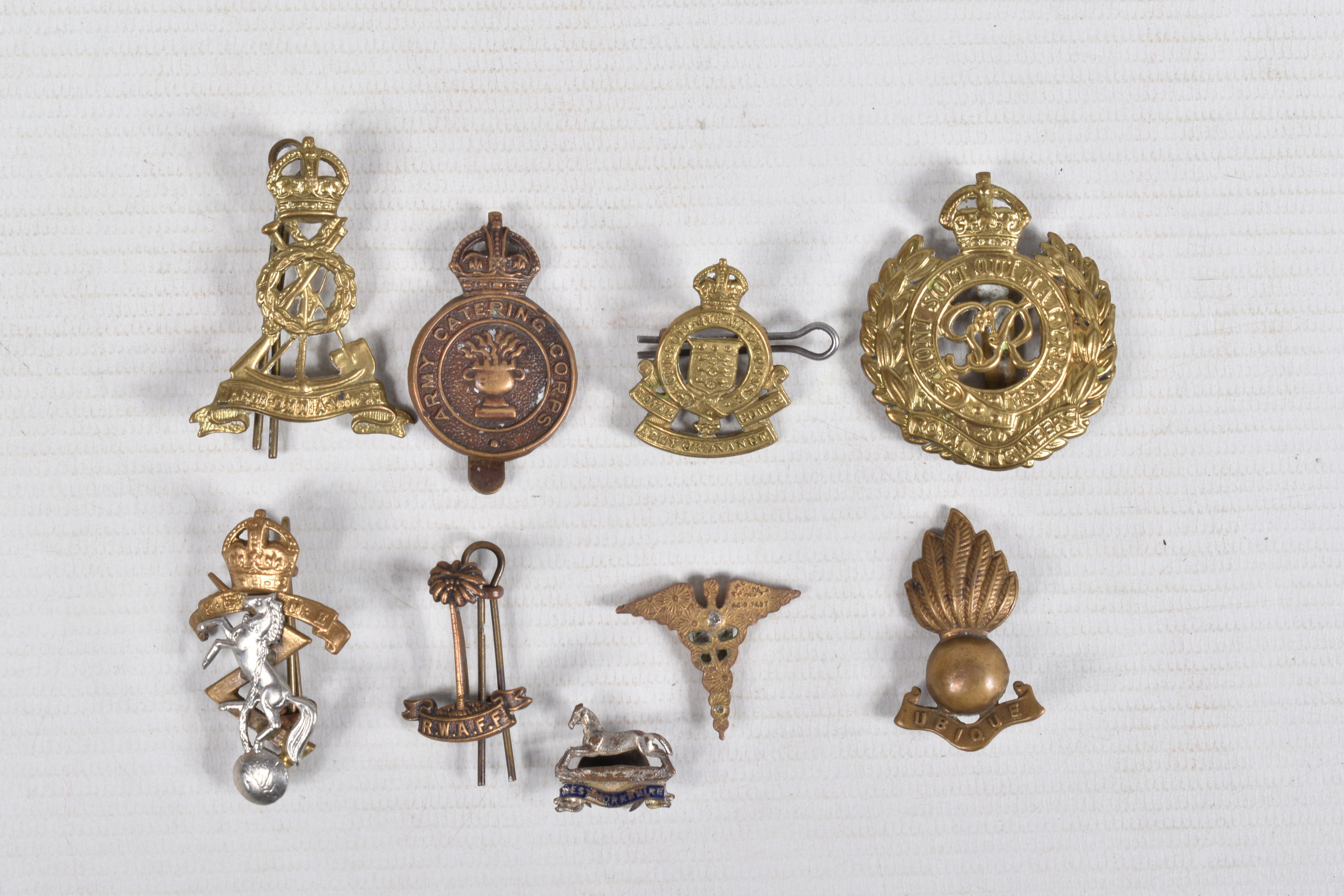 A COLLECTION OF MILITARY CAP AND COLLAR BADGES, these include RE, North ...