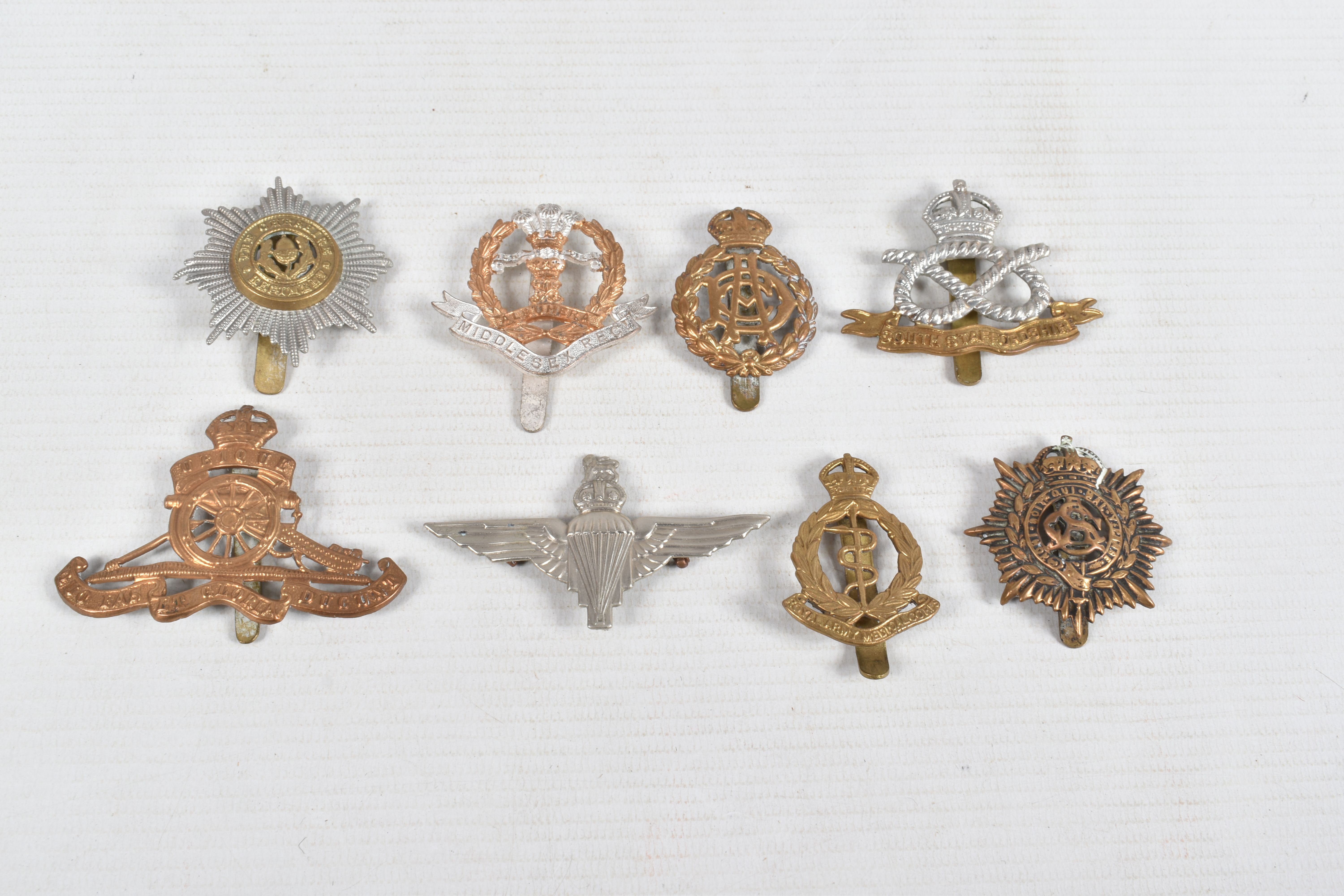 A COLLECTION OF MILITARY CAP AND COLLAR BADGES, these include RE, North ...