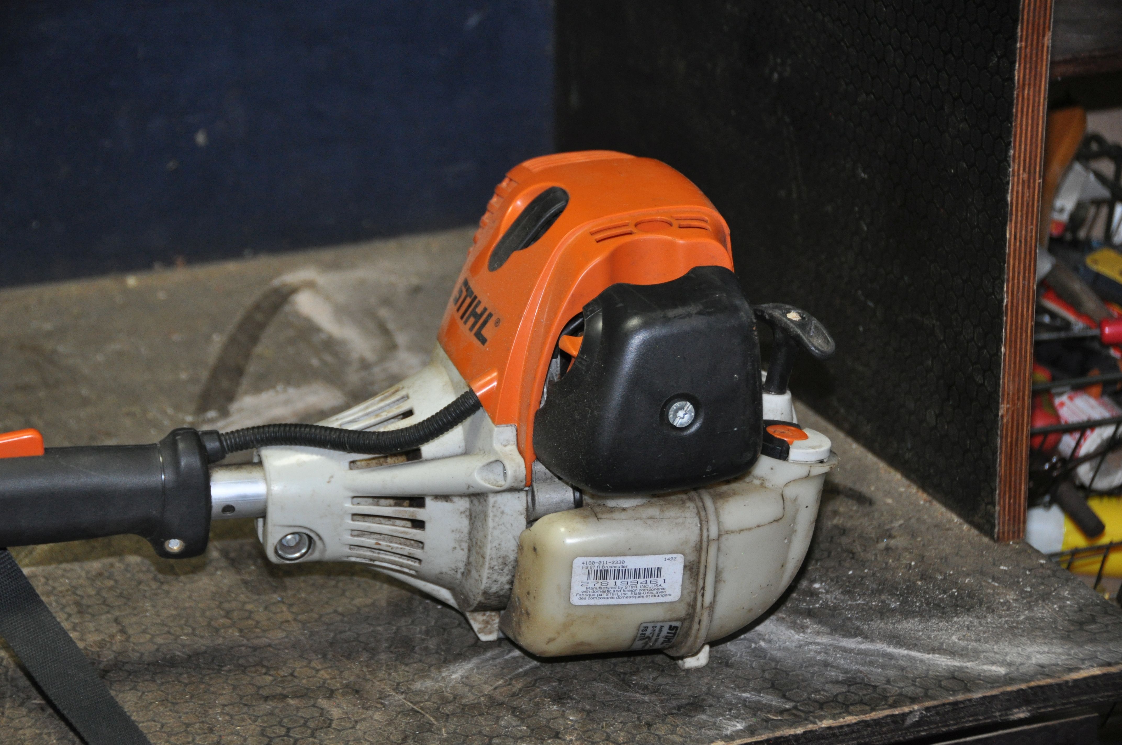 A STIHL FS87R PETROL STRIMMER with blade fitted (no string carriage ...