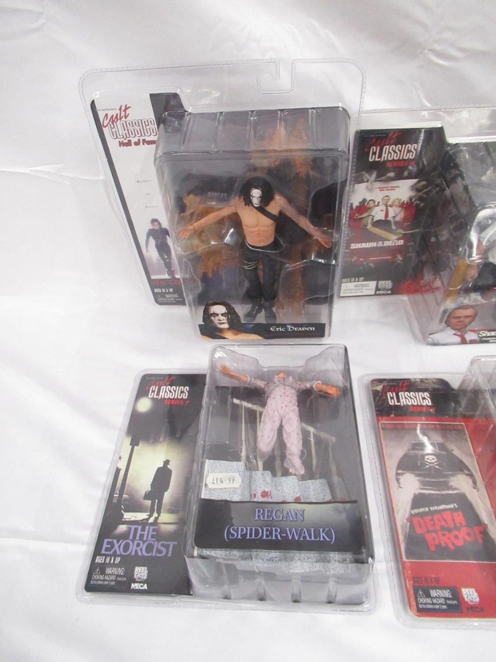 9 NECA 'Cult Classics' cased action figures from Donnie Darko, The Crow ...