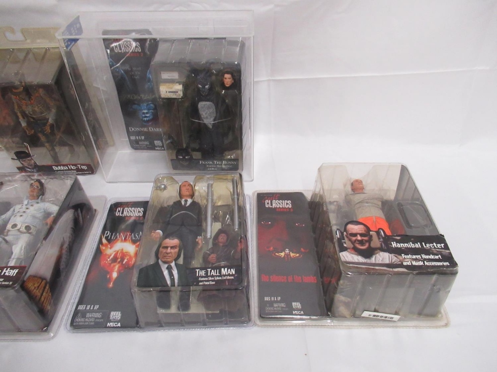 9 NECA 'Cult Classics' cased action figures from Donnie Darko, The Crow ...