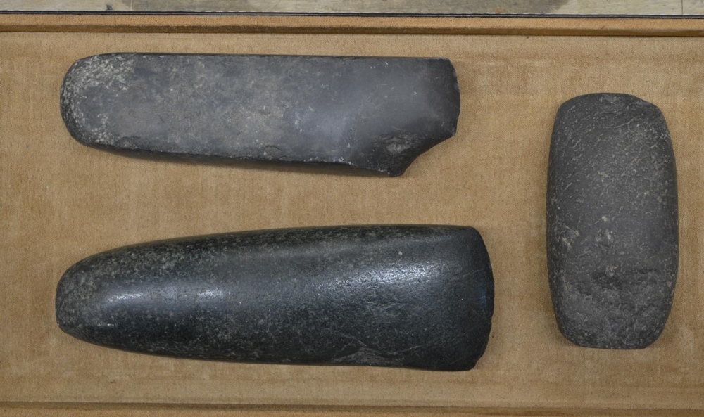 Three neolithic stone hand axe heads, largest L18cm (Victor Brox ...
