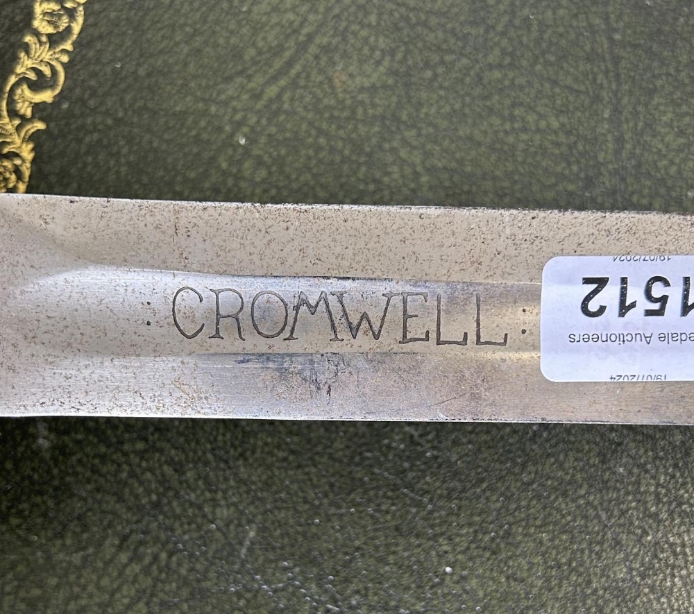 Reproduction of an English civil war period sword, the blade marked ...