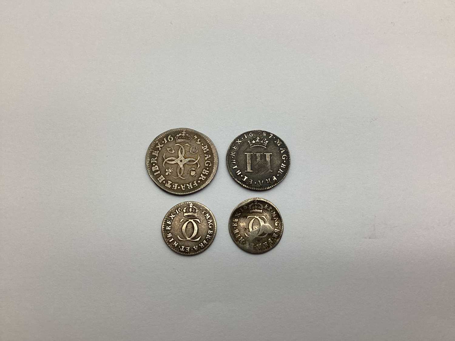 Four XVII Century GB Silver Coins, including a 1687 James II Threepence ...