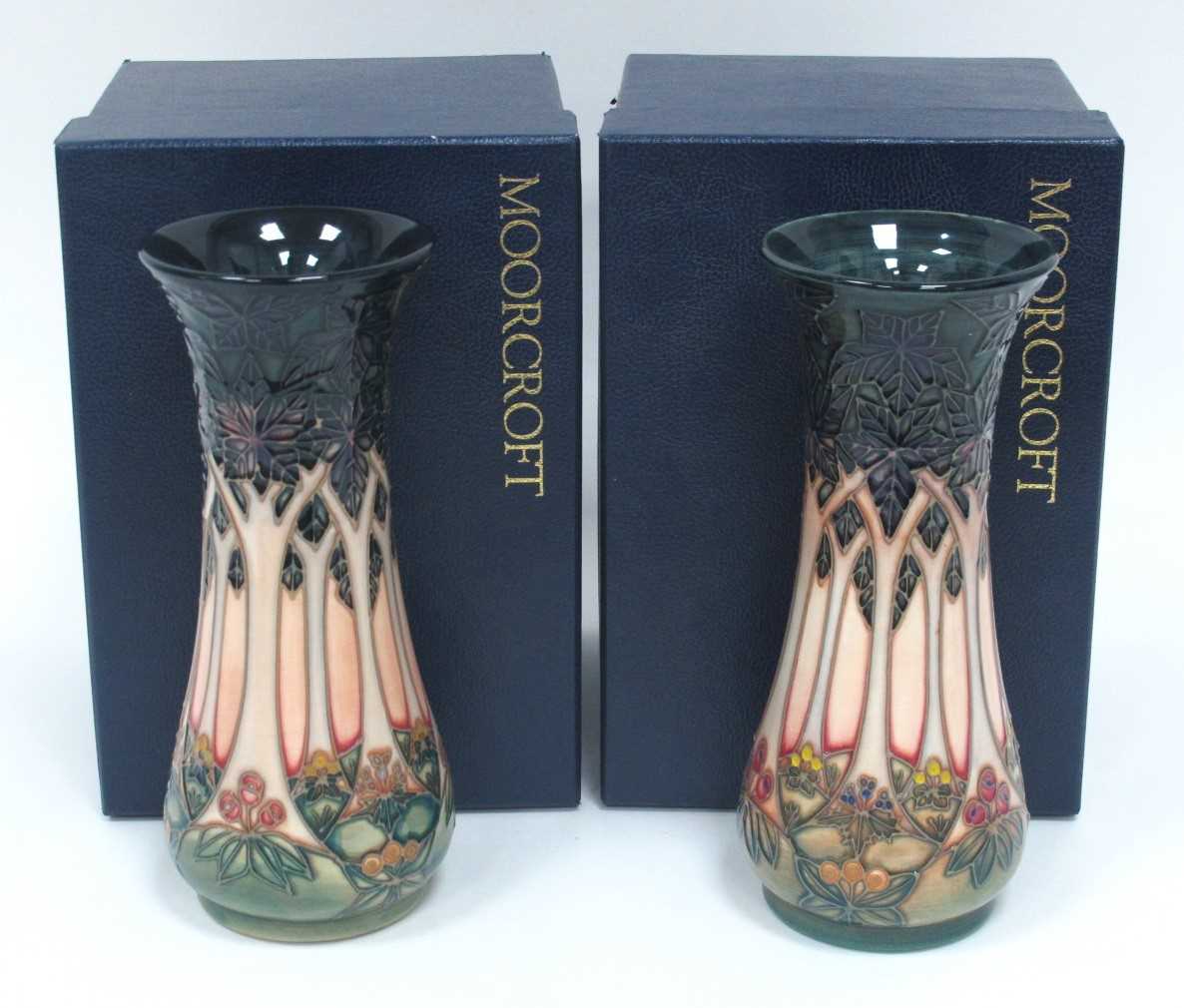 A Pair of Moorcroft Pottery Vases, of waisted cylindrical form, in the ...