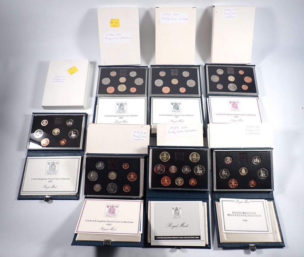 A group of seven Royal Mint UK proof coin collection sets, 1983-1989