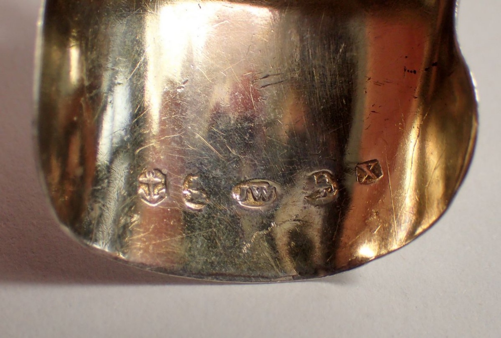 A silver gilt caddy spoon with mother of pearl handle, Birmingham 1821 ...