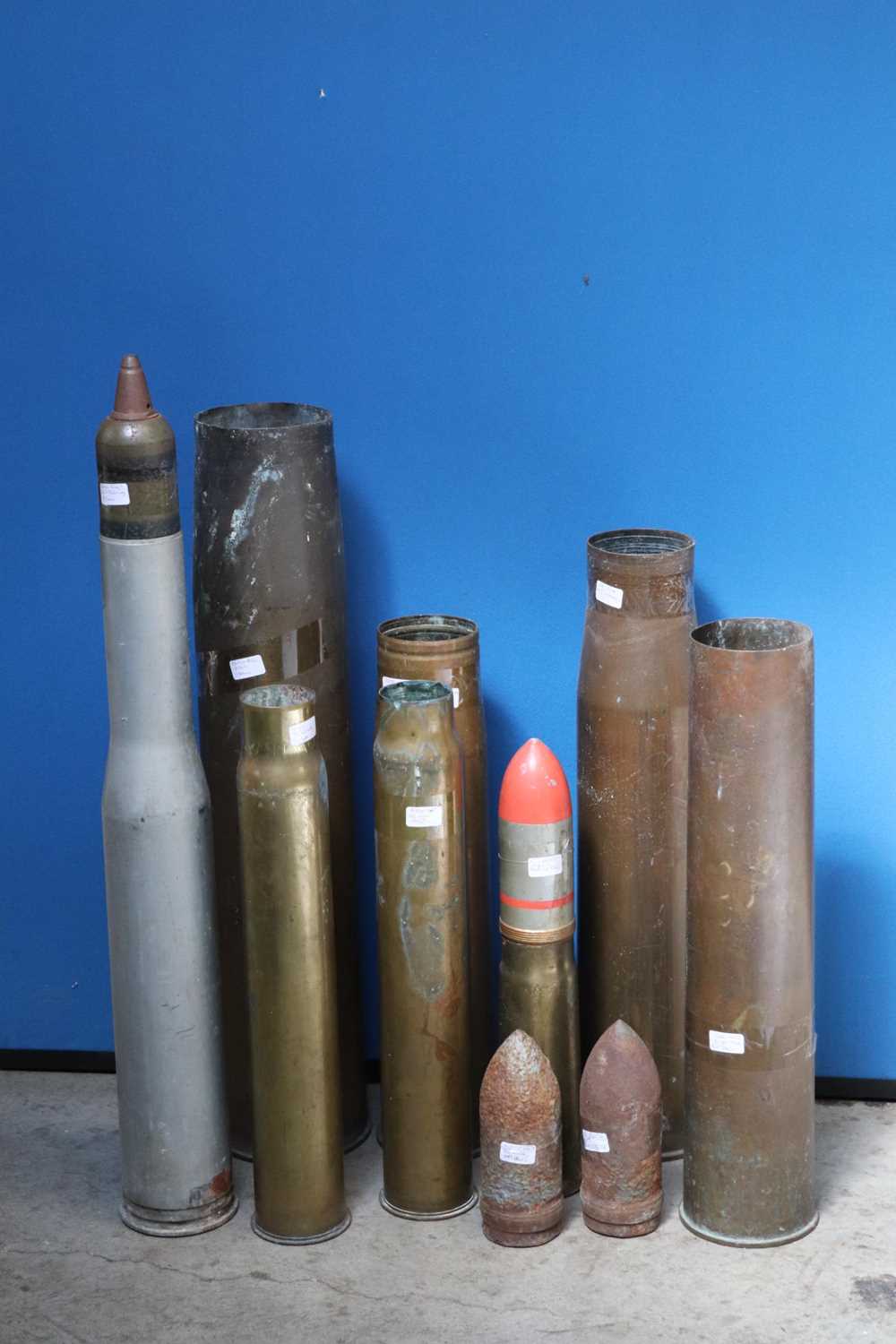 A collection of cases inc. UK WWII 1943, UK 105mm Tank 1963, UK 1978 4. ...