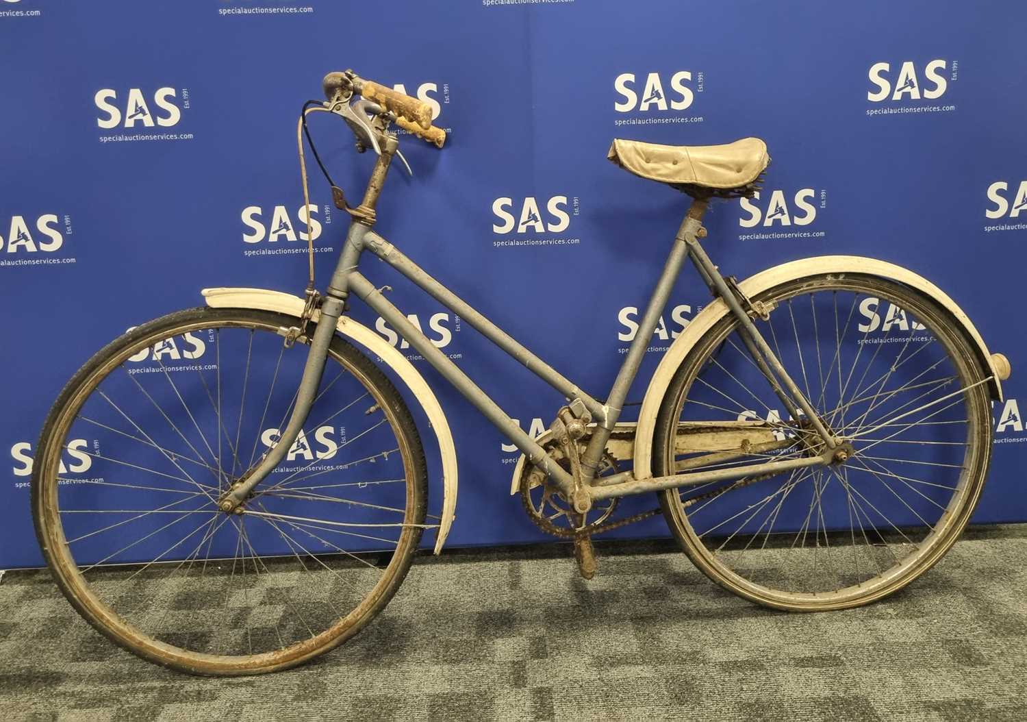 A blue Phillips lady's bicycle, having white painted guards, with ...