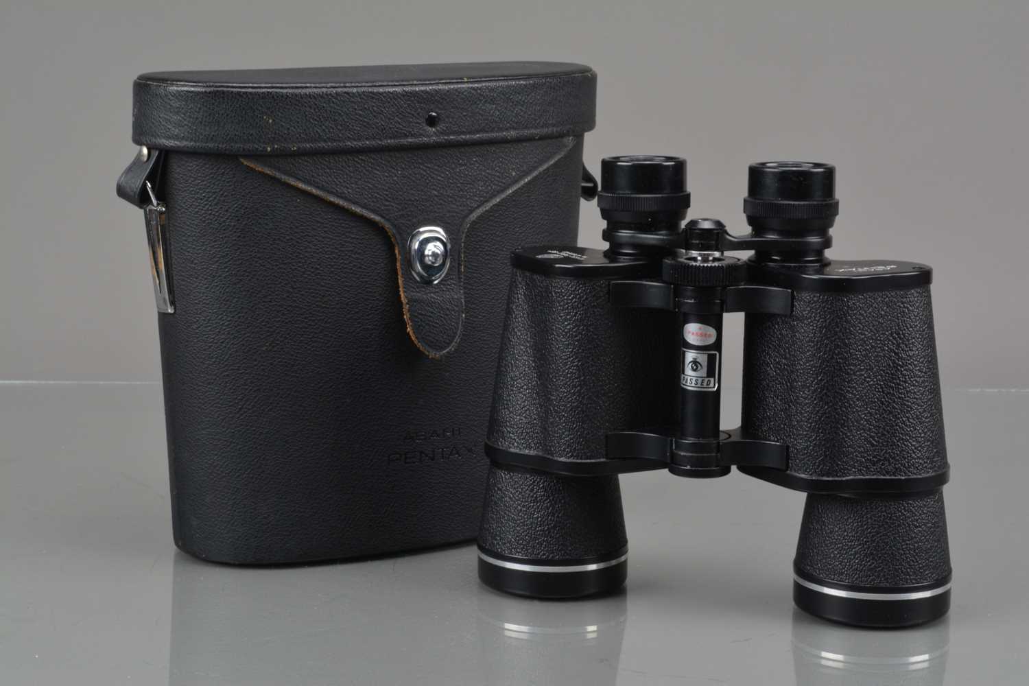 A Pair of Asahi Pentax 10x50 5.5° Binoculars, body G-VG, elements G-VG ...